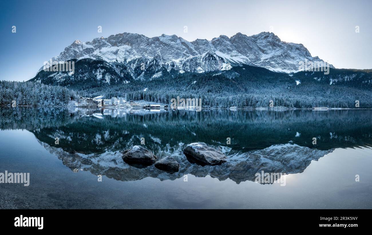 Panorama of lake Eibsee in winter with reflection of mountain zugspitze ...