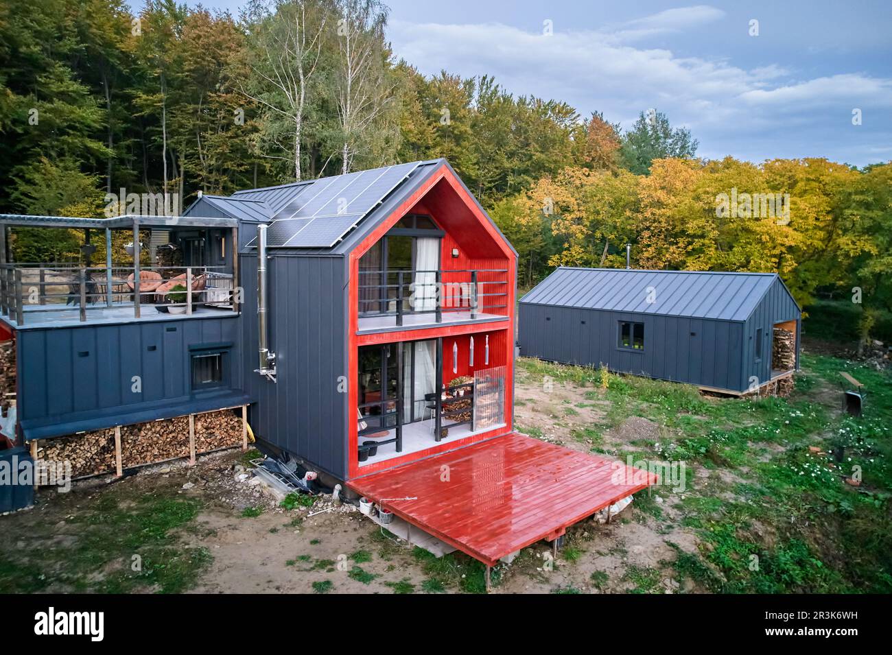 New modern house cottage with solar photovoltaic panel system on roof ...