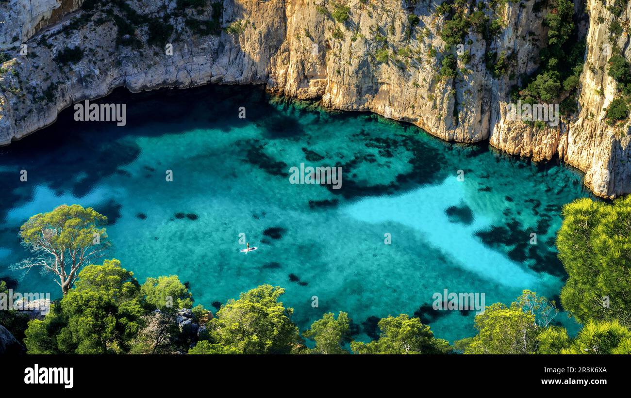 Stand up paddling in Calanque dâ€™en vau national park calanque in ...