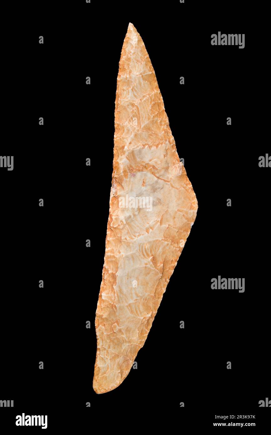 Rare triangular knife on blade retouched on both sides. Patinated beige ...