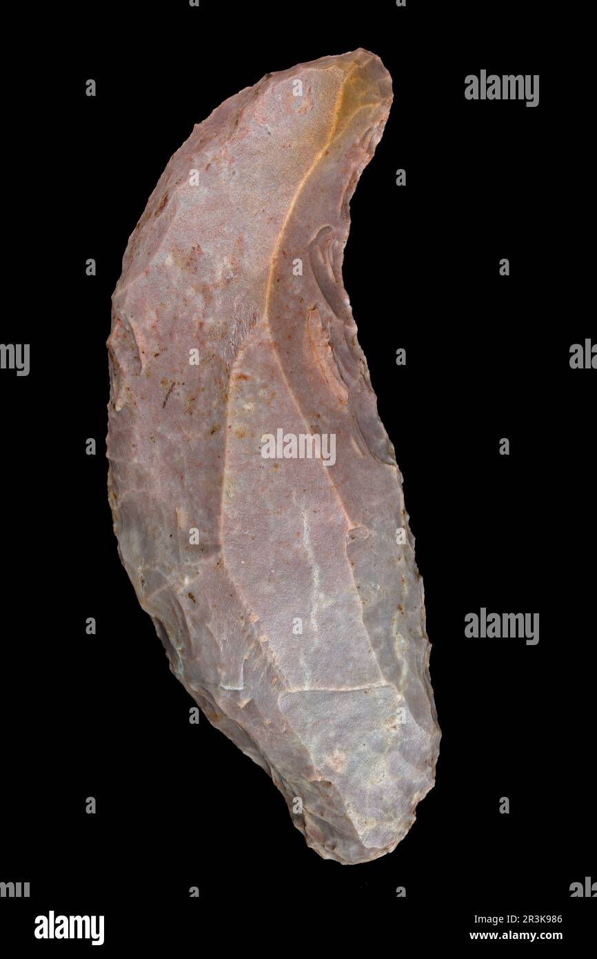 Curved scraper (atypical shape). Pink Jasper. Mali, Neolithic. 11.2 cm Stock Photo - Alamy