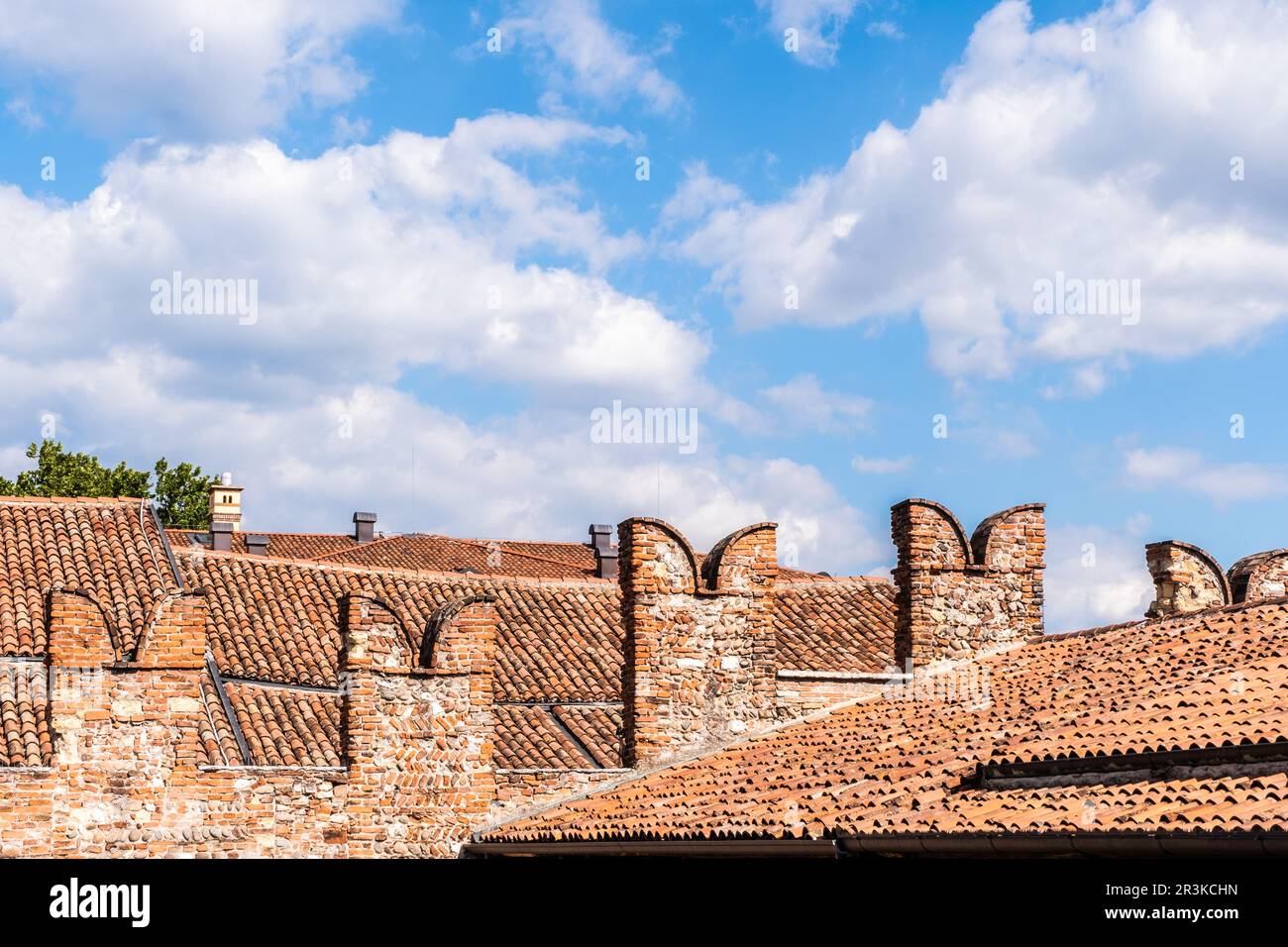 Medieval rooftop of Verona with blue sky with clouds Stock Photo - Alamy