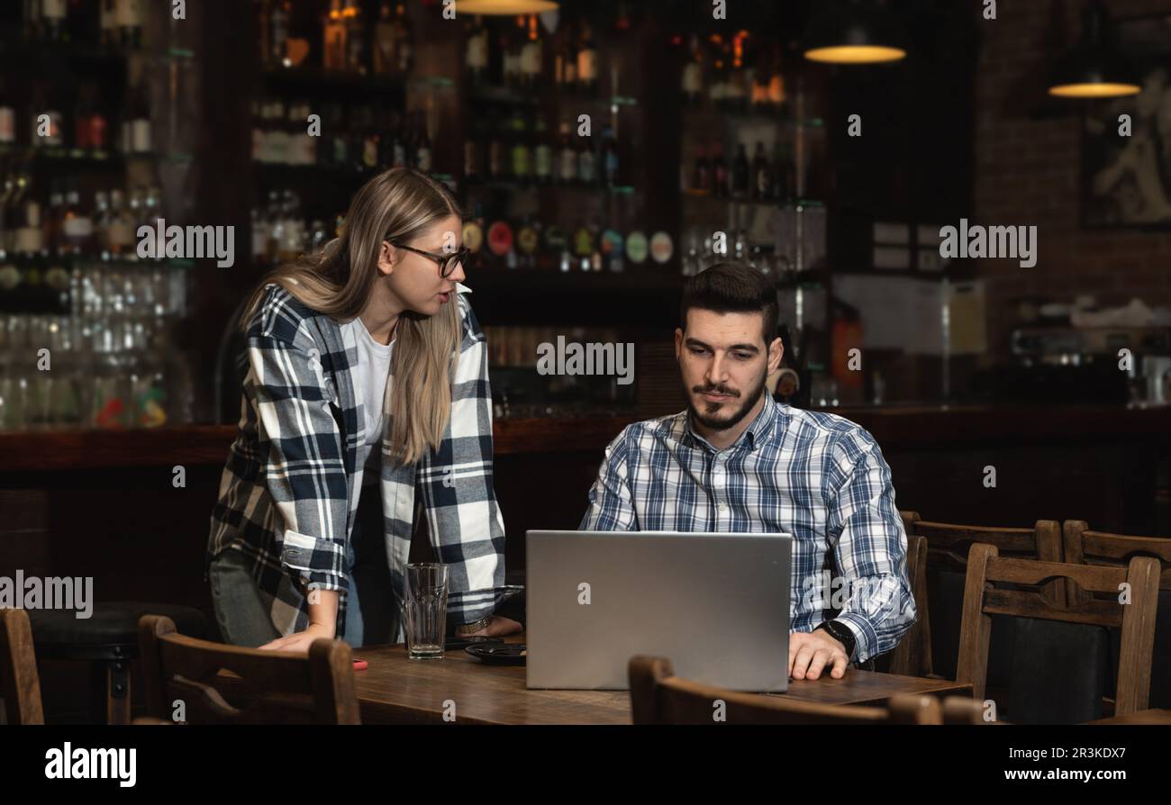 Two Diverse Entrepreneurs Have a Team Meeting in Their Stylish Coffee ...