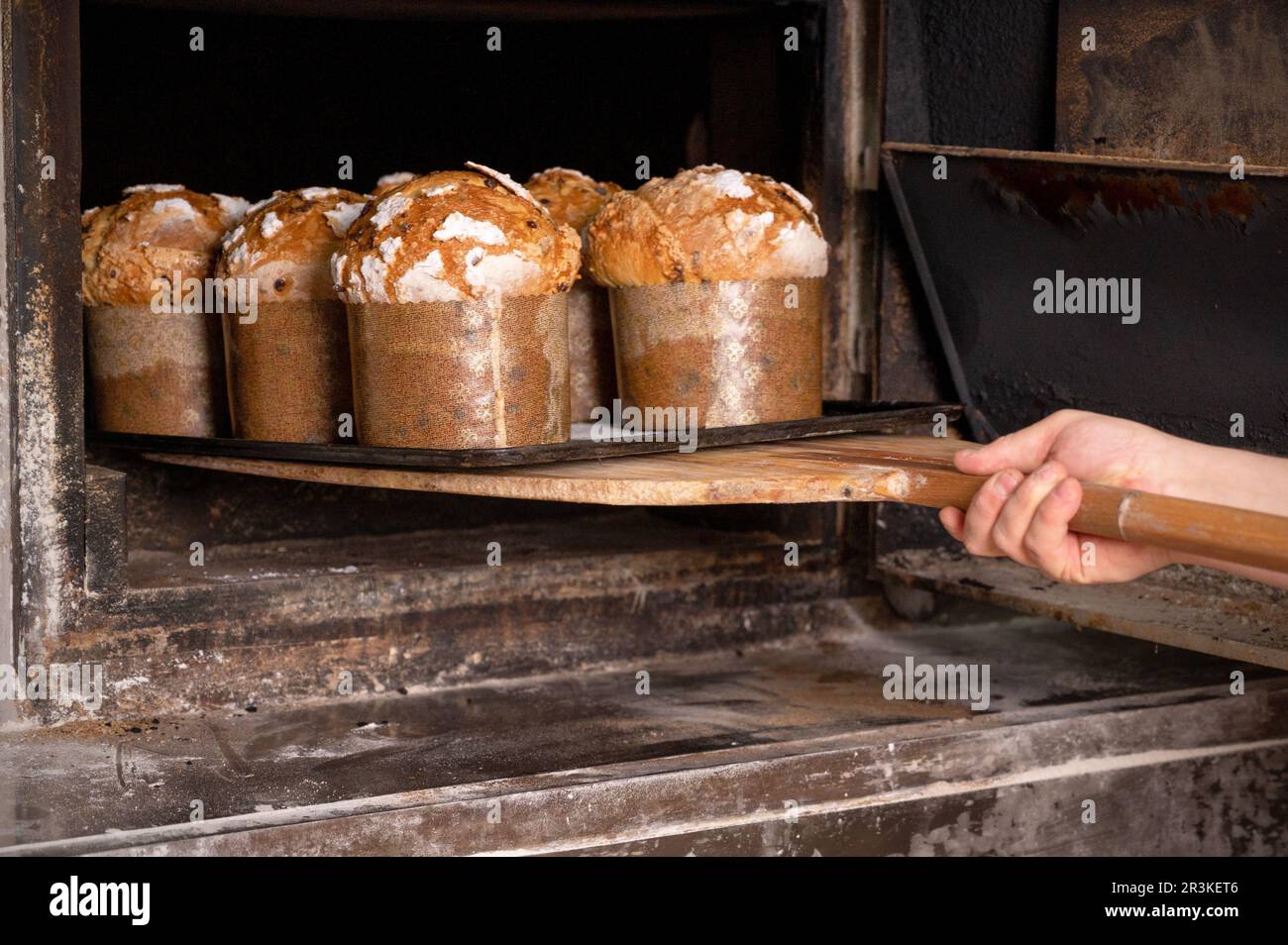 Man taking baked bread from hi-res stock photography and images - Alamy