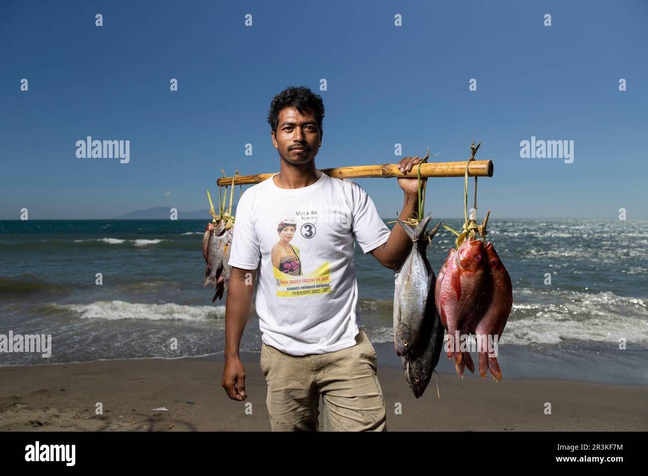 Fisherman selling fish in Dili, Timor-Leste Stock Photo - Alamy