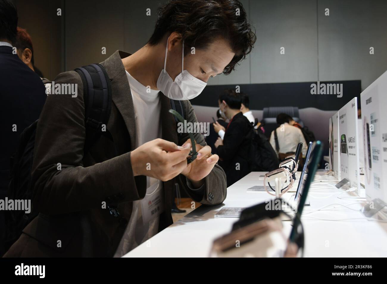 Tokyo, Japan. 24th May, 2023. A visitor tries smartwatch at the launch ...