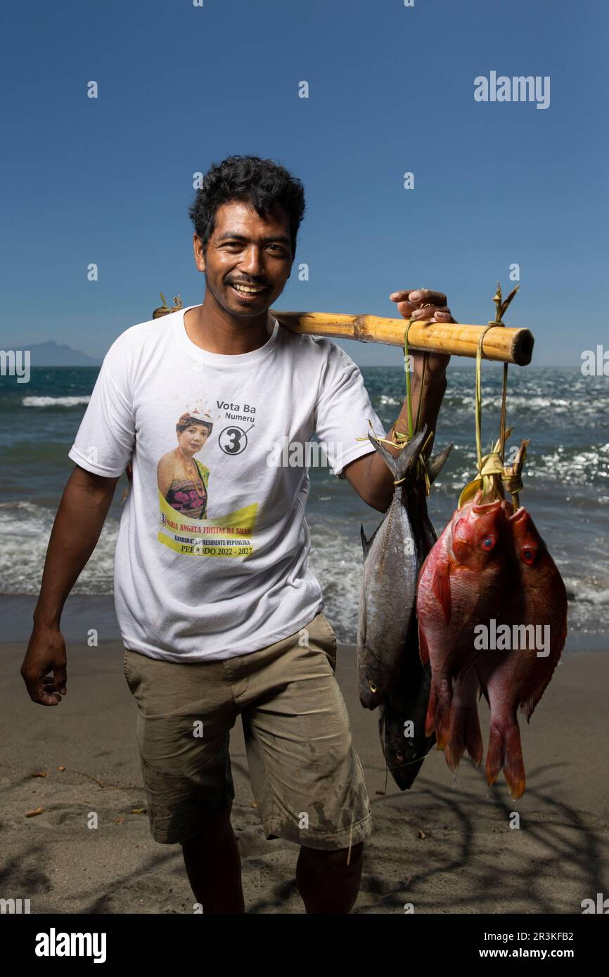 Fisherman selling fish in Dili, Timor-Leste Stock Photo - Alamy