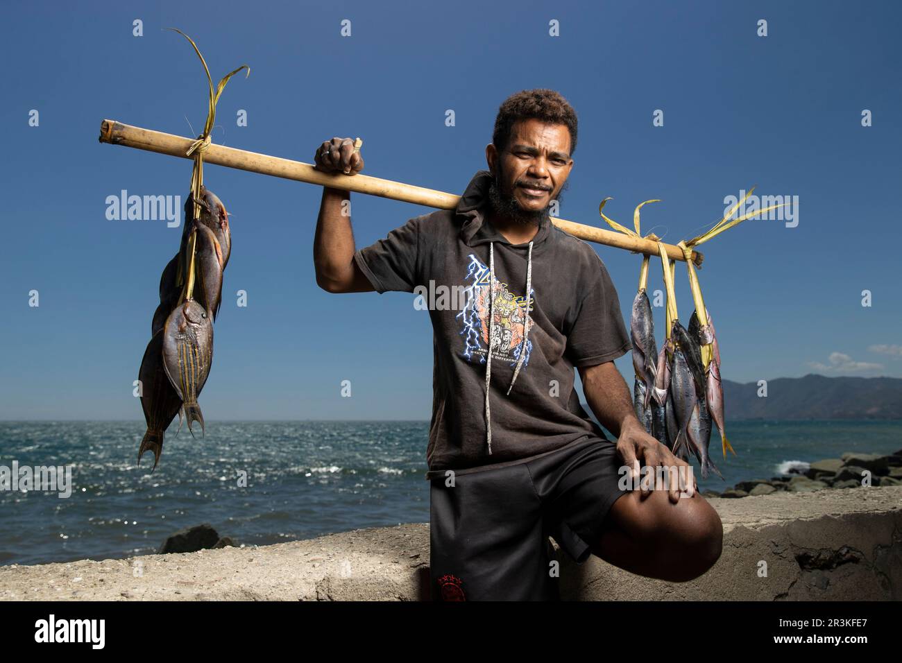 Fisherman selling fish in Dili, Timor-Leste Stock Photo - Alamy