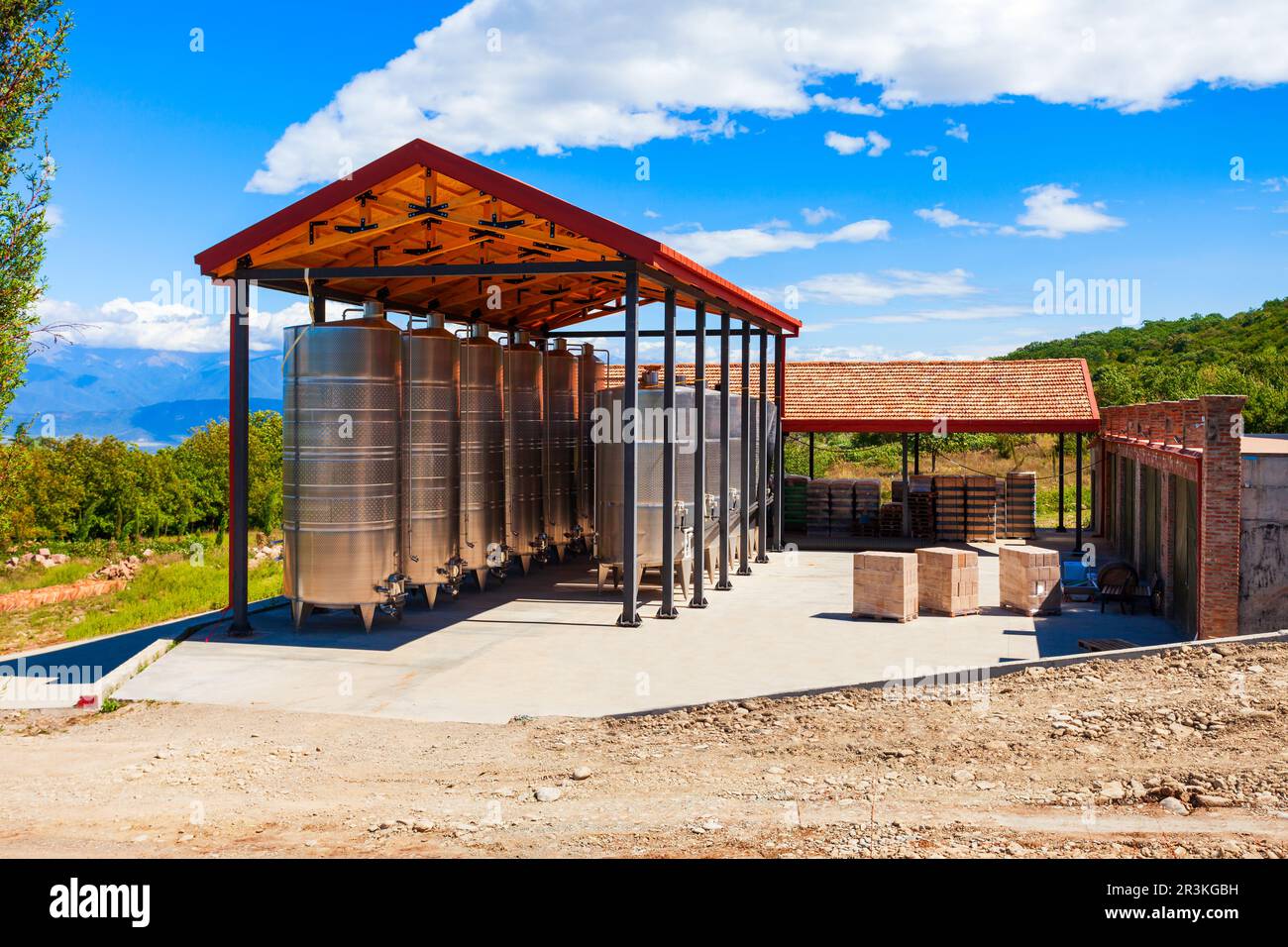 Stainless steel storage tanks with wine at open air Stock Photo - Alamy