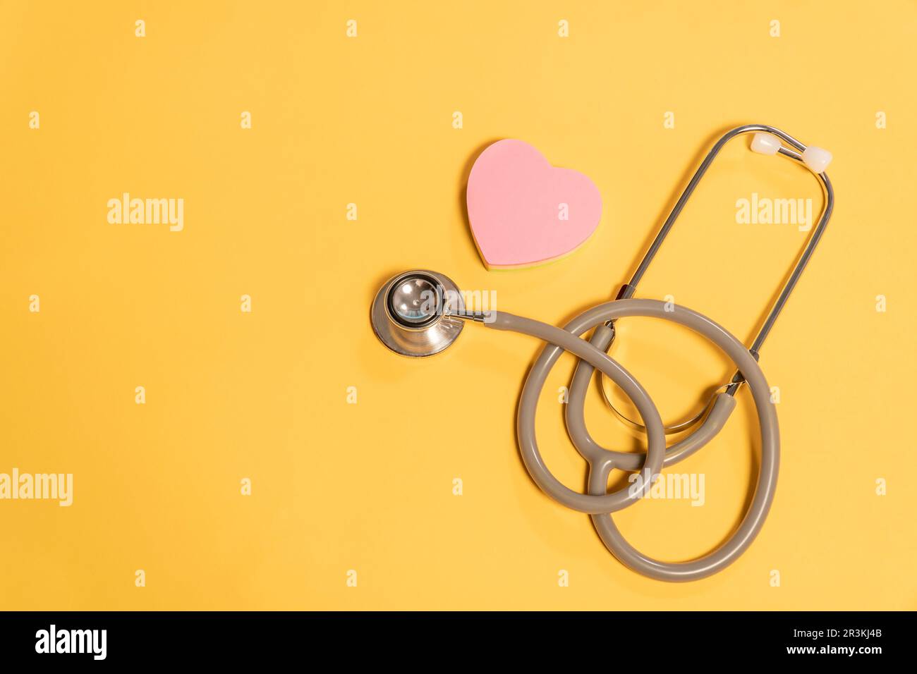 Single Head Stethoscope on yellow background Stock Photo - Alamy
