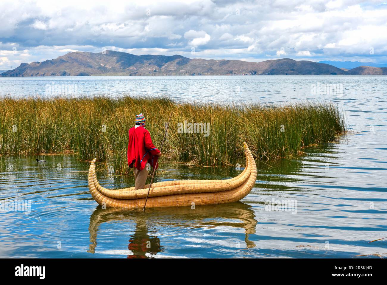Aymara on their Totora boat (Schoenoplectus californicus subsp. tatora ...