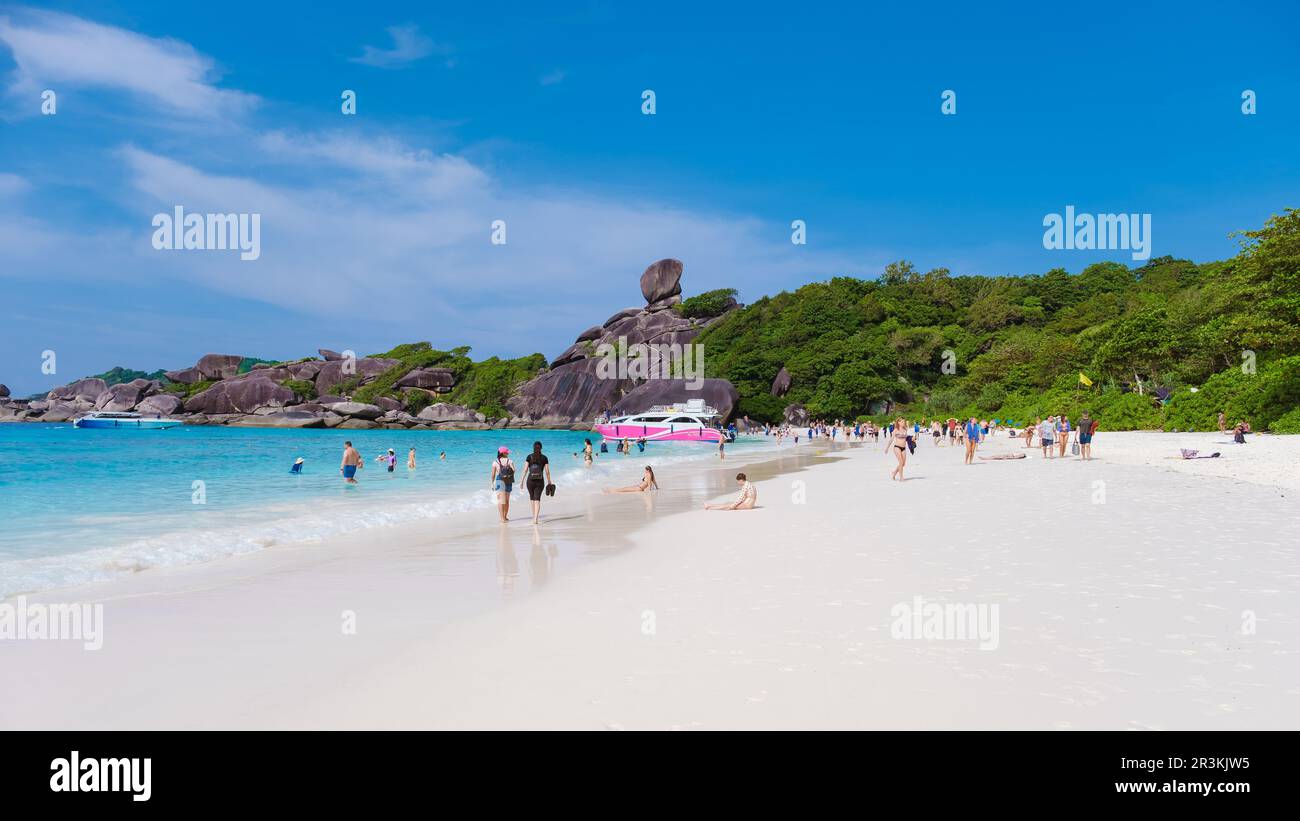 Similan Islands Phangnga Thailand, tourist at the beach wit tour boat ...