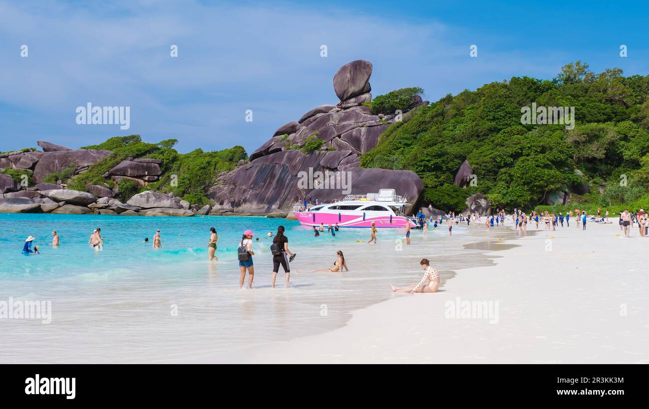 Similan Islands Phangnga Thailand, tourist at the beach wit tour boat ...