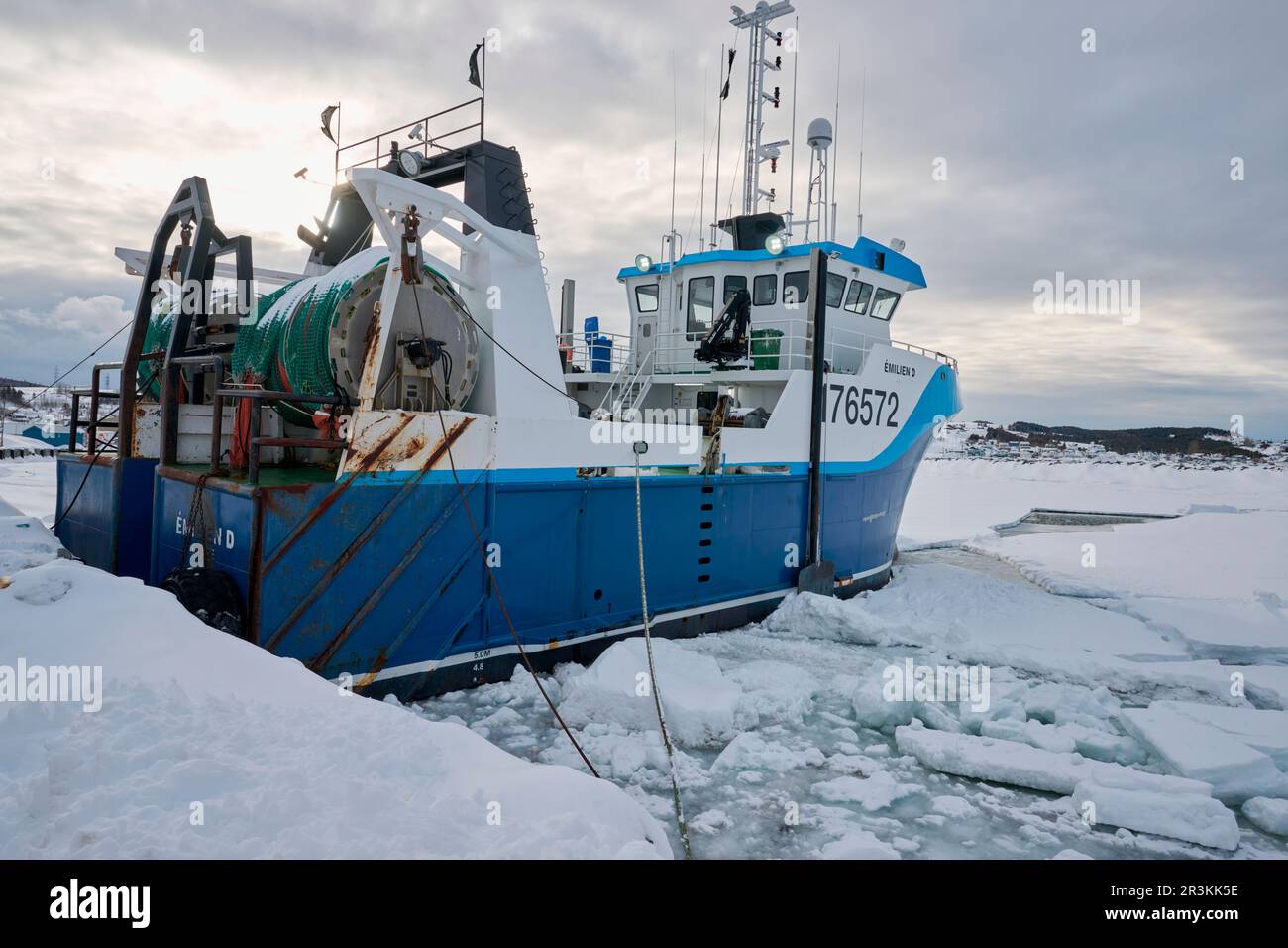 Boats at the quay, Port de l'Anse au Griffon in winter, Gaspesie ...