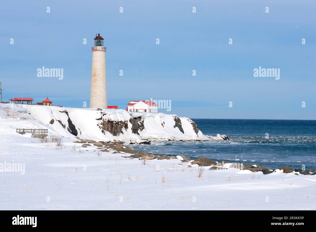 Cap-des-Rosiers lighthouse in winter at the mouth of the St. Lawrence ...