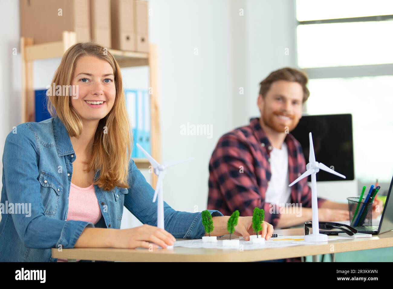 confident team of engineers working together in a architect studio ...