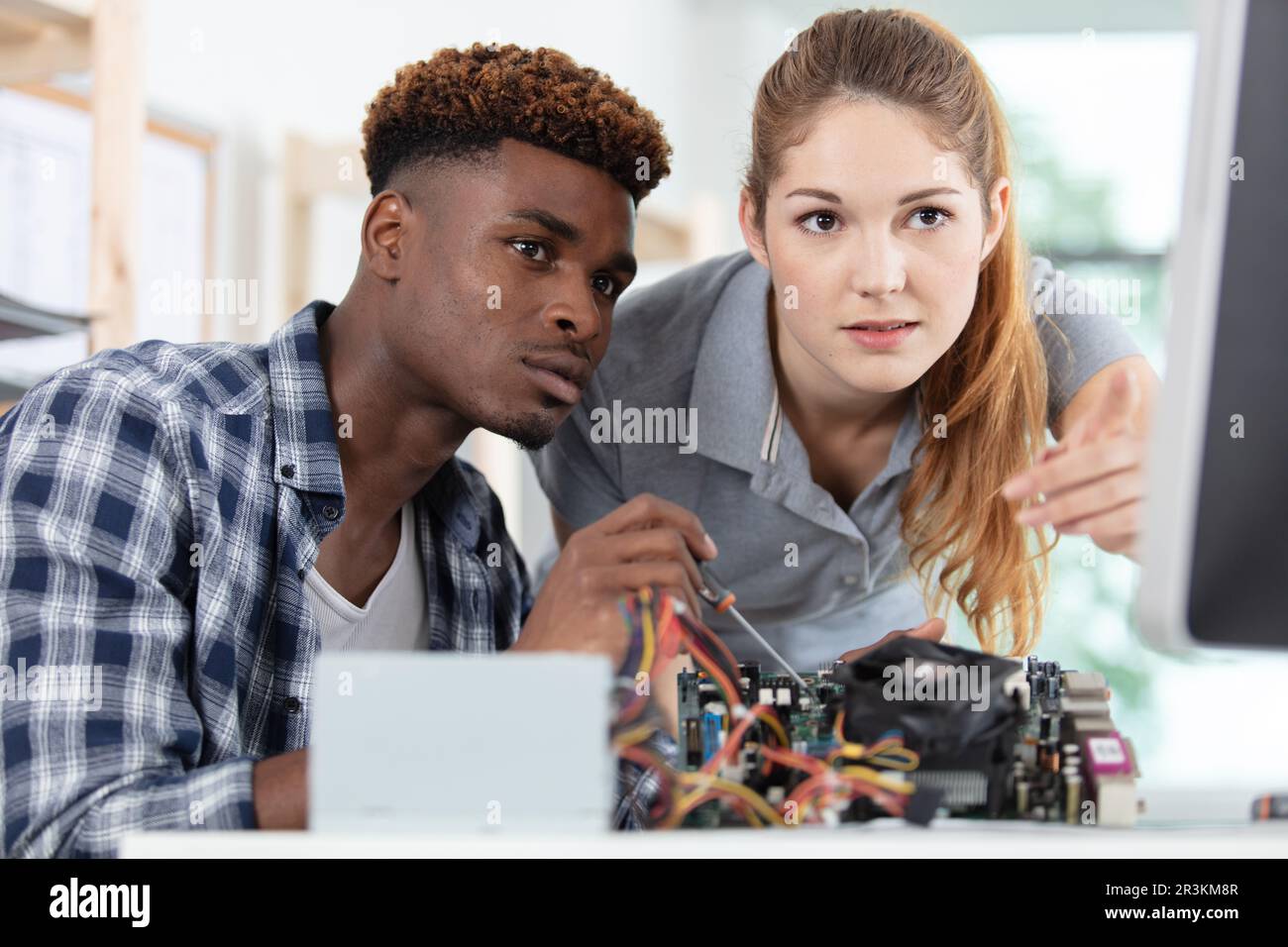 portrait of technician repairing a computer unit Stock Photo - Alamy