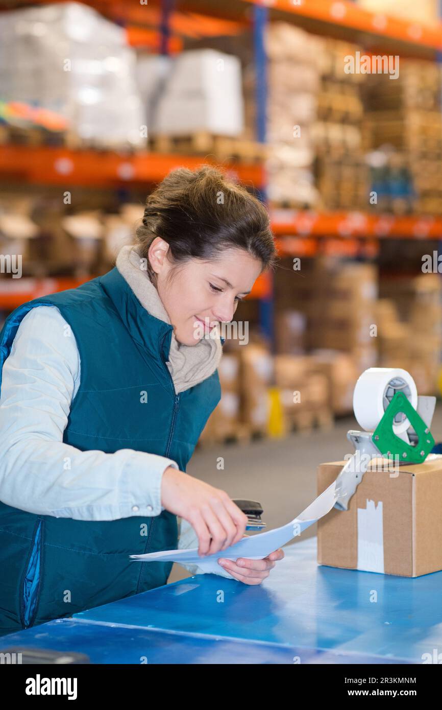 worker preparing the ordered product Stock Photo - Alamy