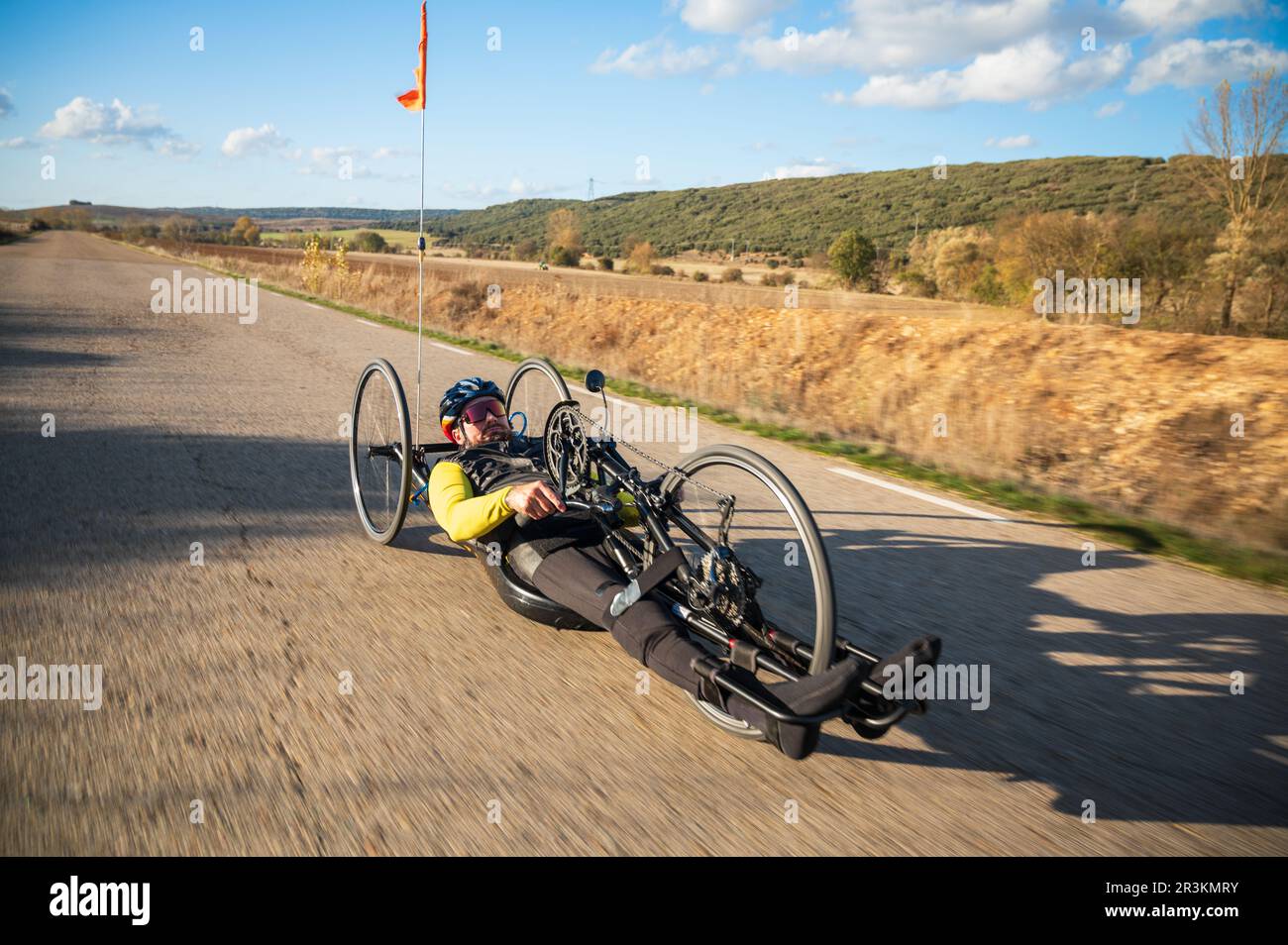 Athlete with disability training with His Handbike on a Track Stock ...