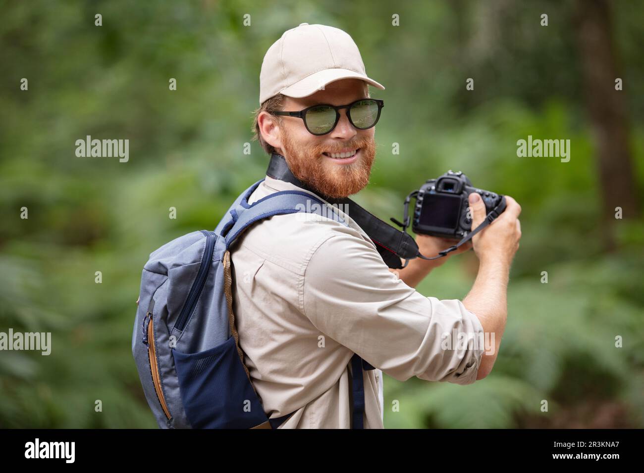 Women photographer camera outside hiking hi-res stock photography and ...