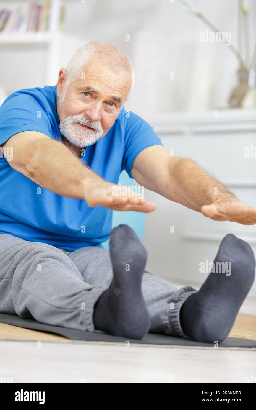 senior patient doing physical exercises with his therapist Stock Photo ...