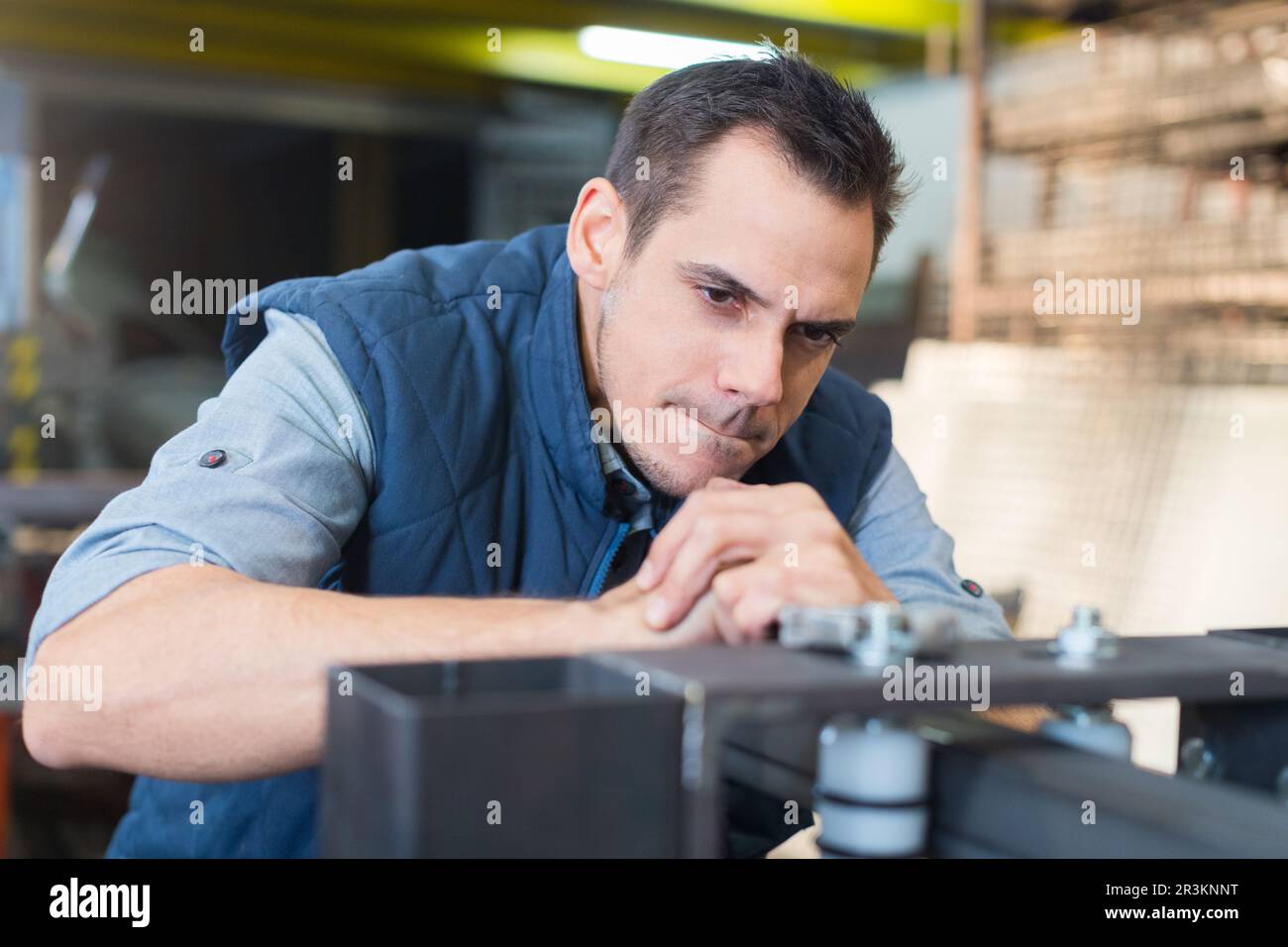 milling machine operator working in factory workshop Stock Photo - Alamy