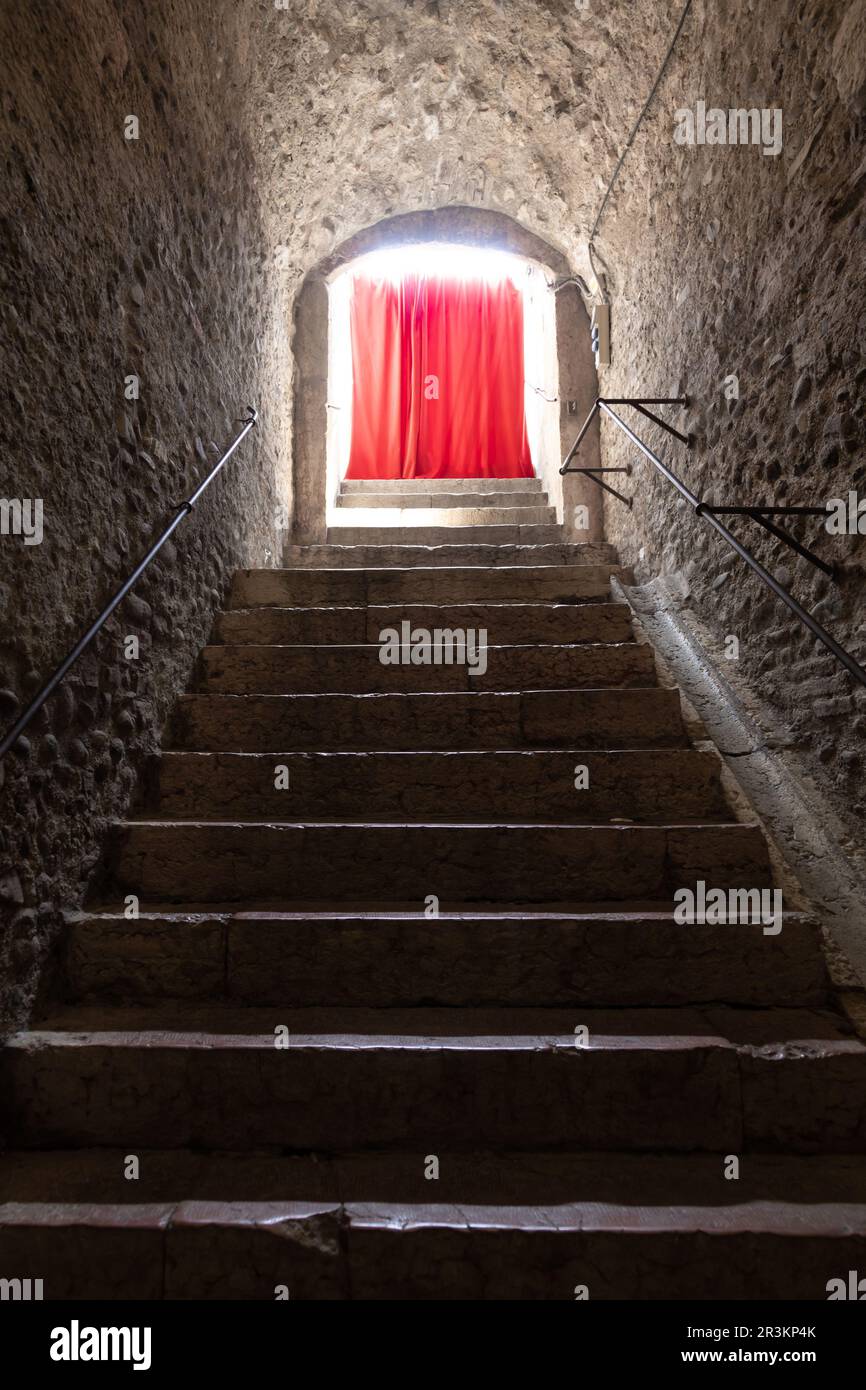 Old corridor with red curtain at the end. Concept for mystery, gothic ...