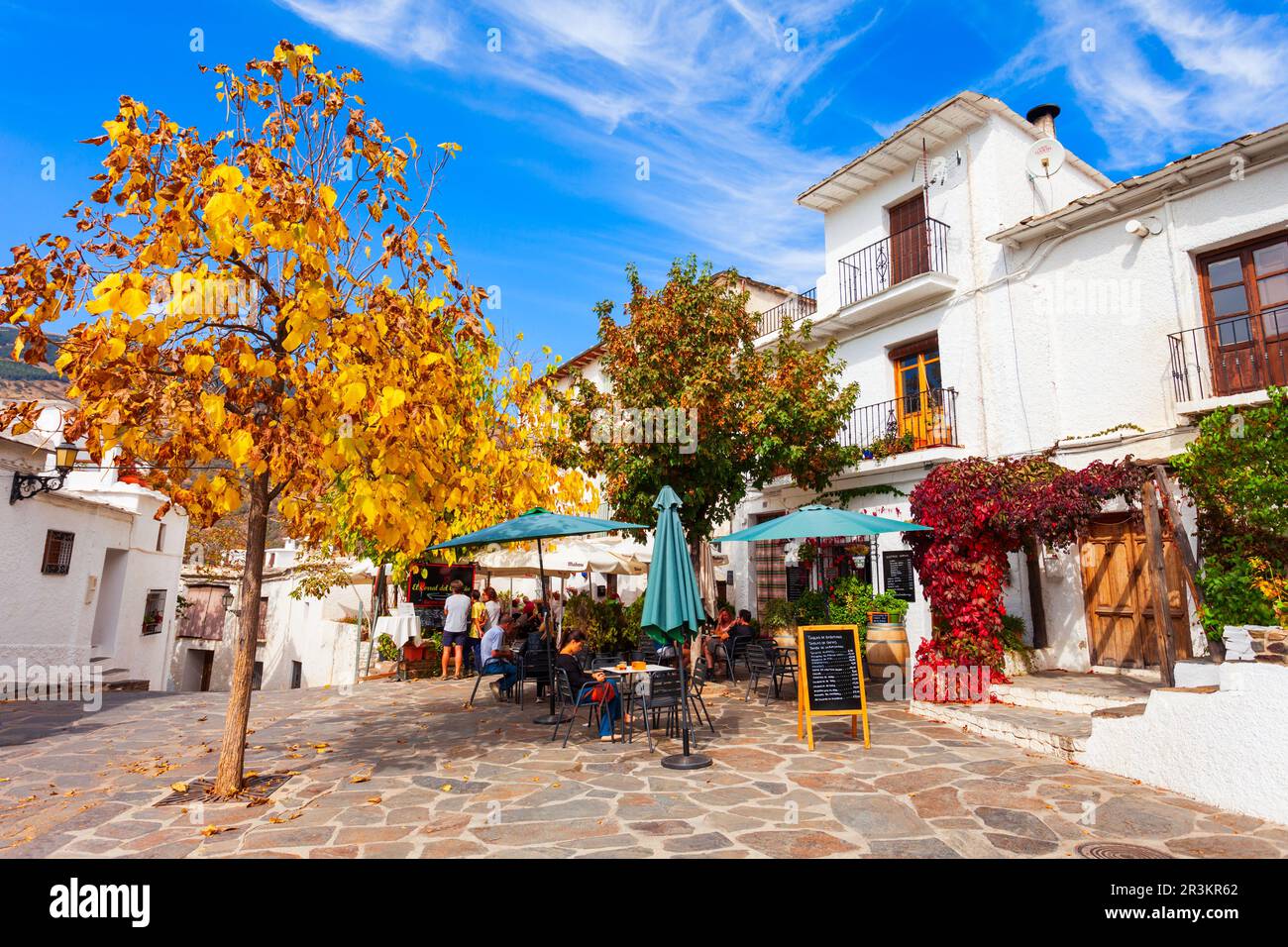 Capileira, Spain - October 21, 2021: Fountain at Plaza Calvario square ...