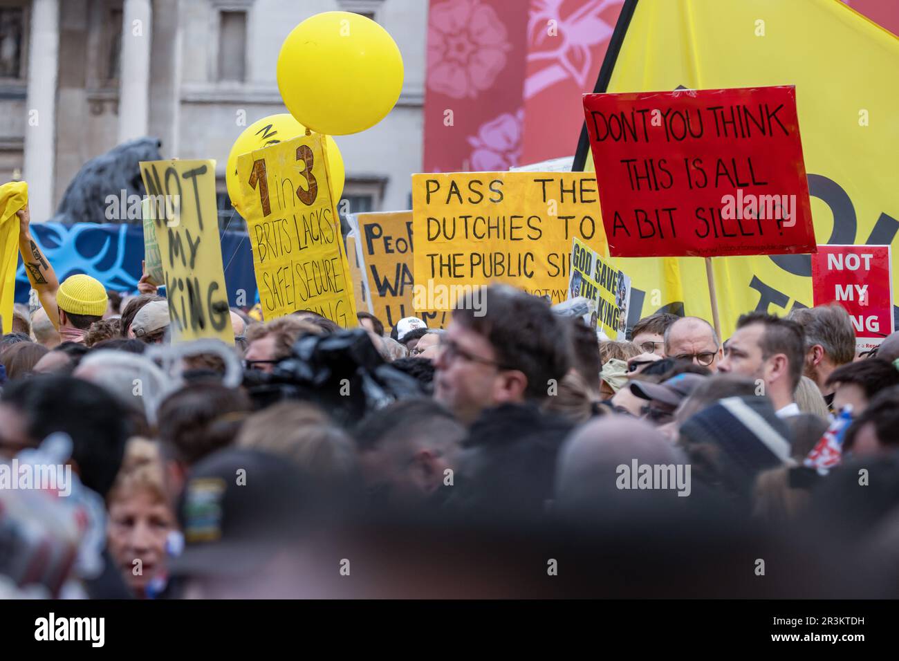 London, UK. 6th May, 2023. Signs are held aloft in Trafalgar Square by ...