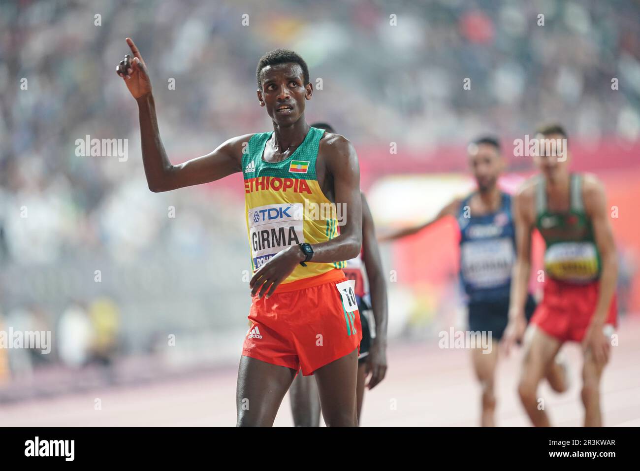 Lamecha Girma participating in the 3000 meter steeplechase at the Doha ...