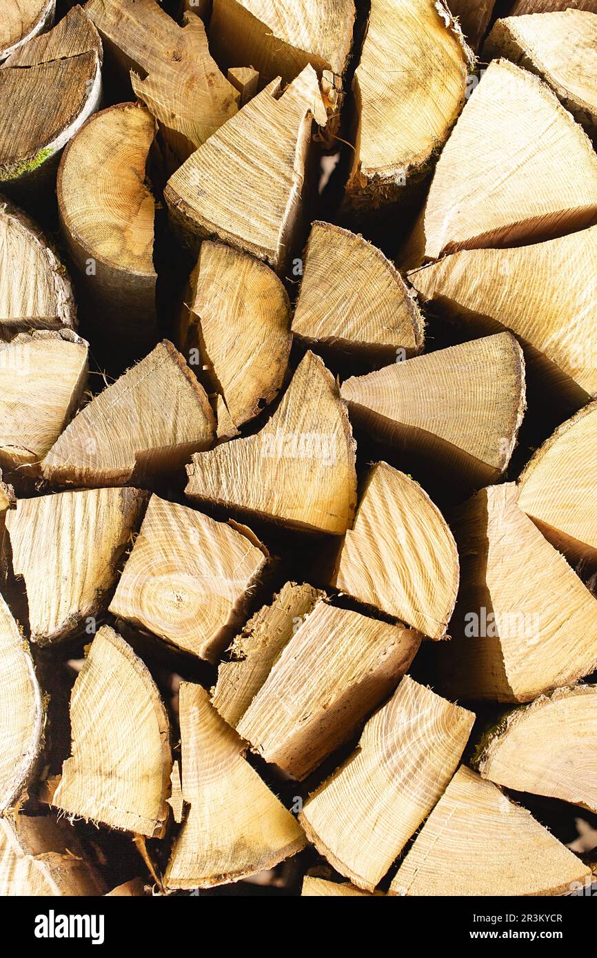 Wall of firewood, background of dry chopped firewood. Wooden background ...