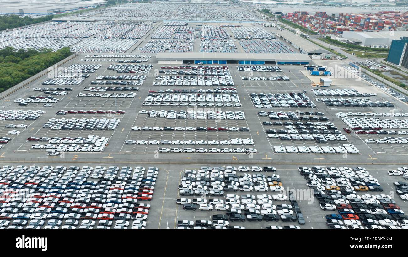 Aerial view of new cars stock at factory parking lot. Above view cars ...