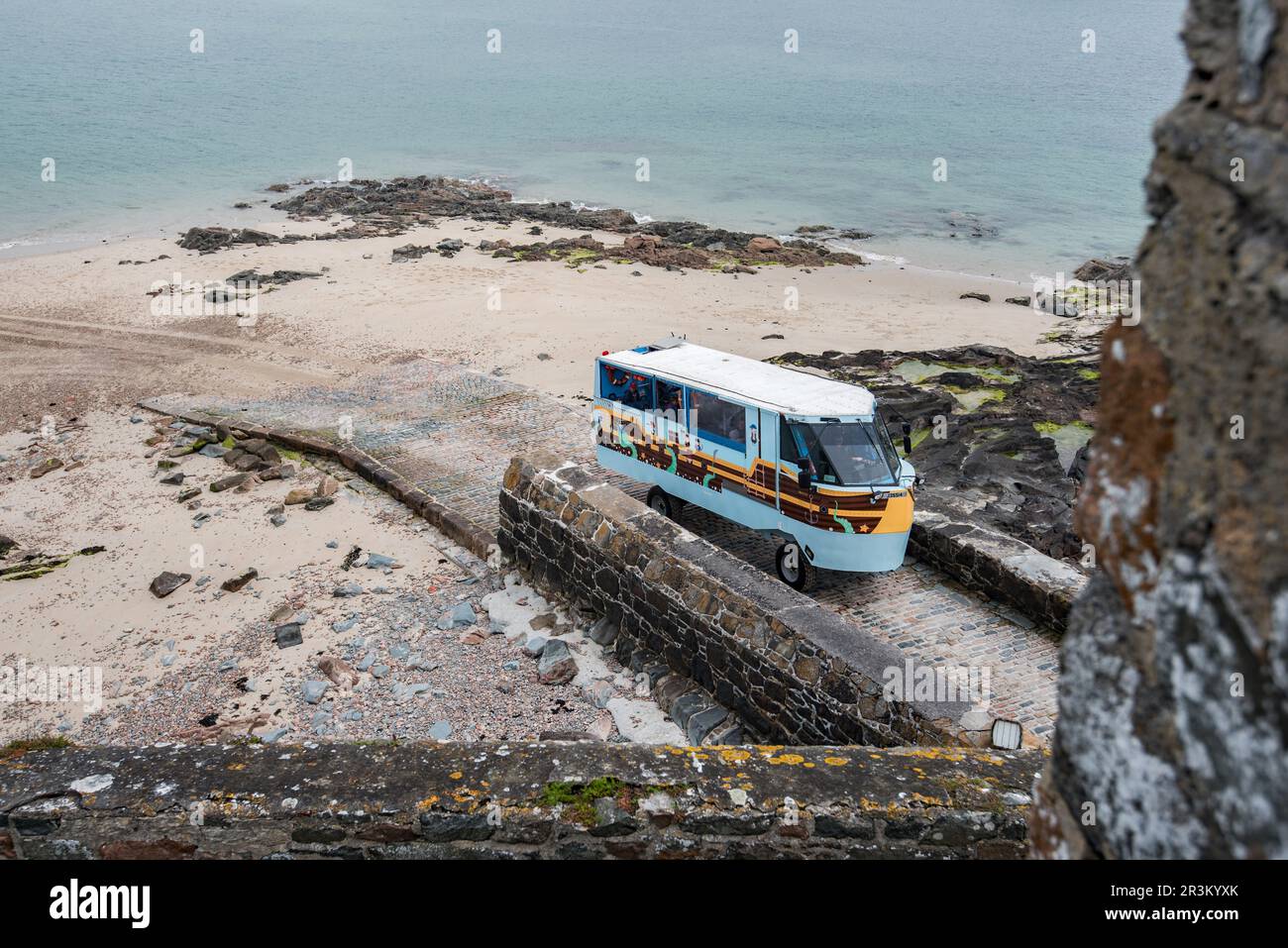 The amphibious duck ferry vehicle negotiates the tidal waters towards ...
