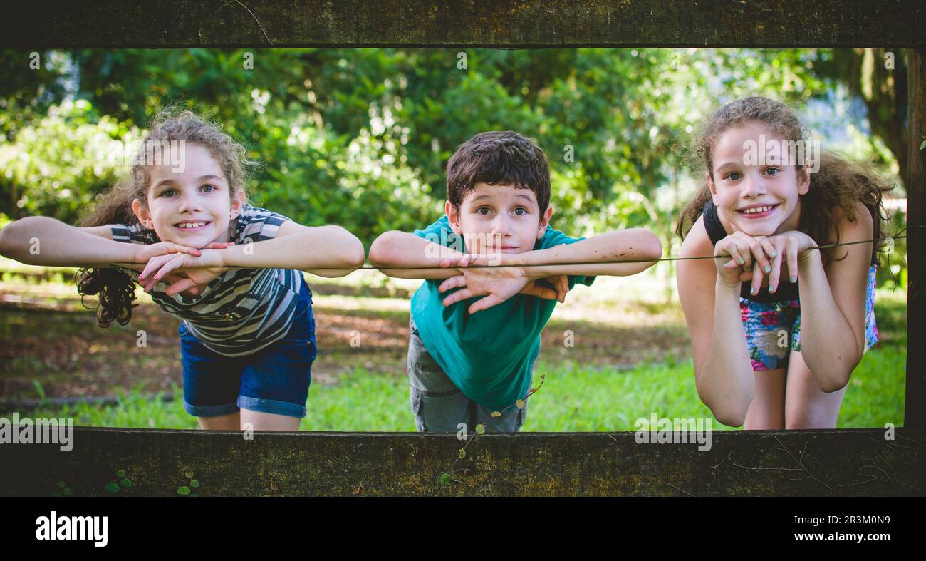 Portrait of children playing in the forest Stock Photo - Alamy