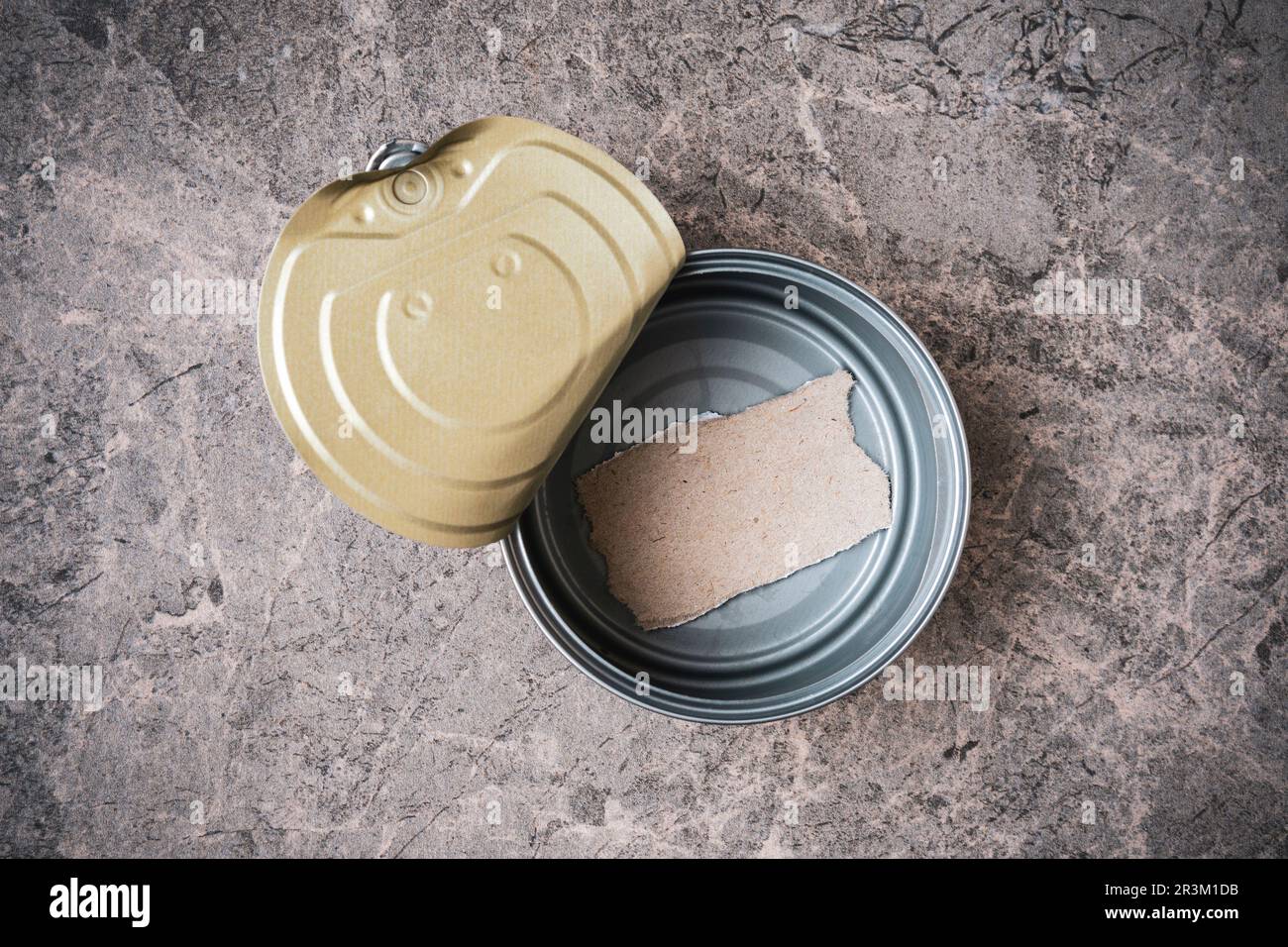 Opened tin can with a blank paper piece for your own text Stock Photo ...