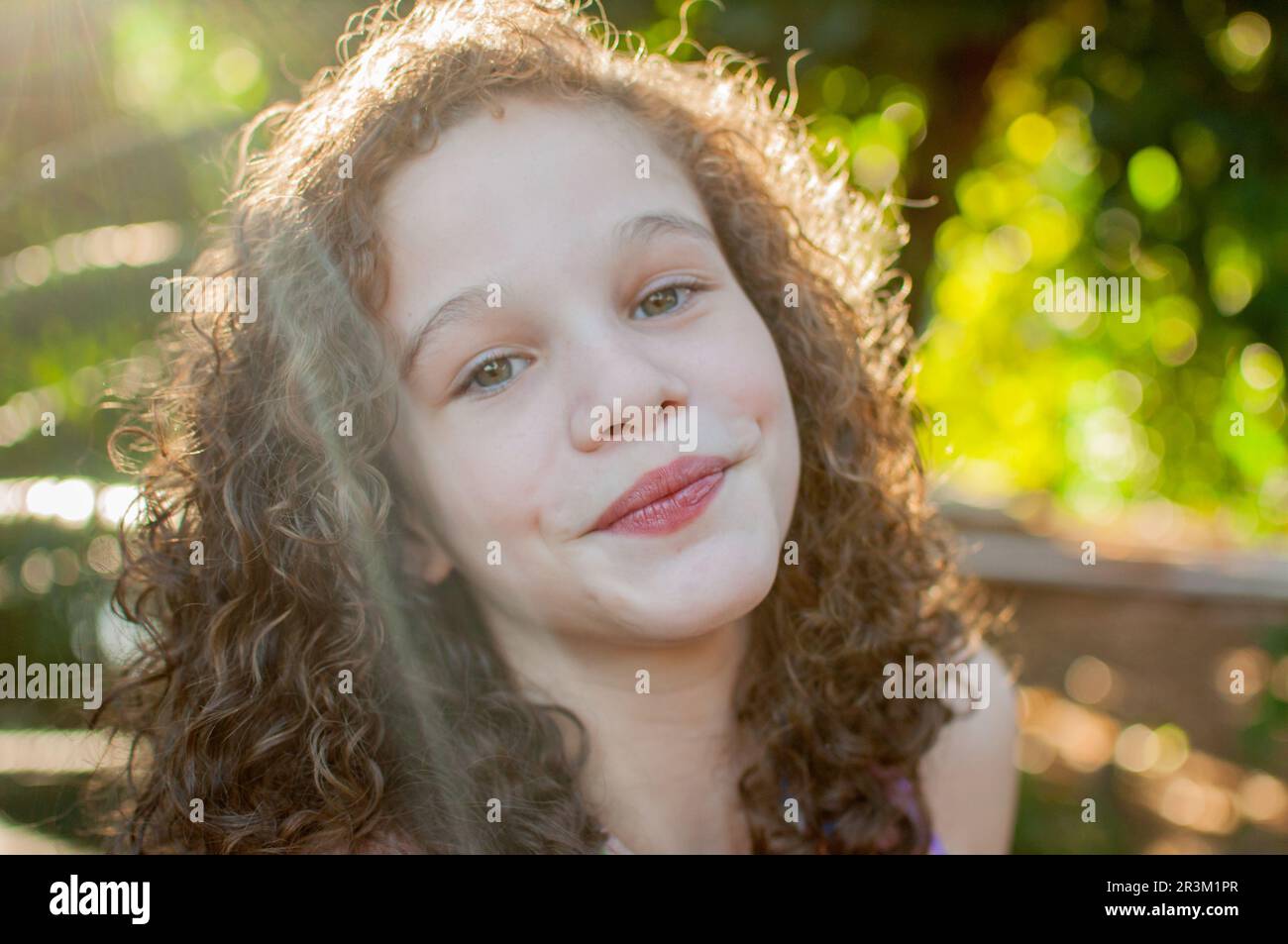 Curly hair girl hi-res stock photography and images - Alamy