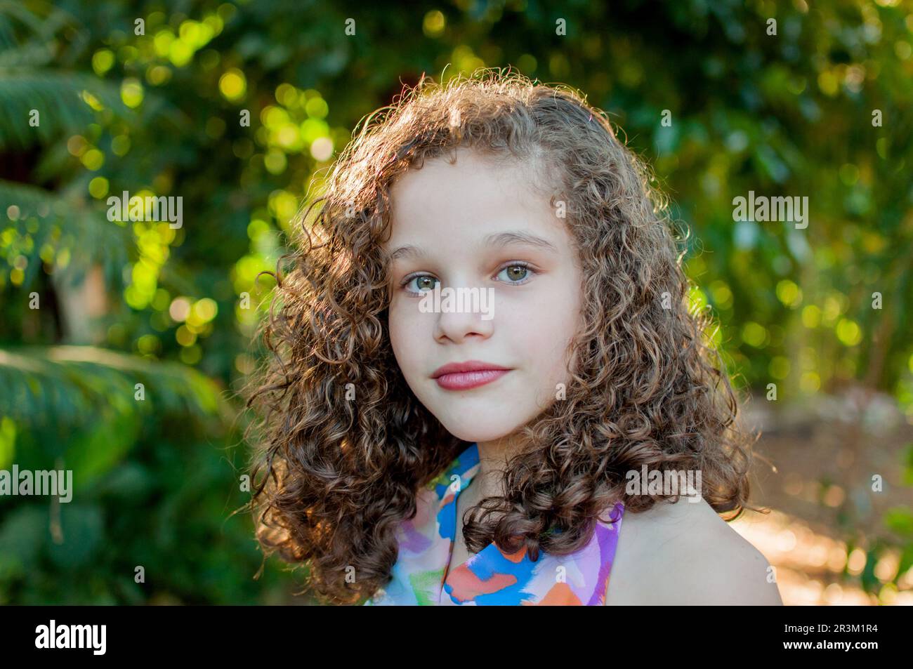 Portrait of curly hair girl Stock Photo - Alamy