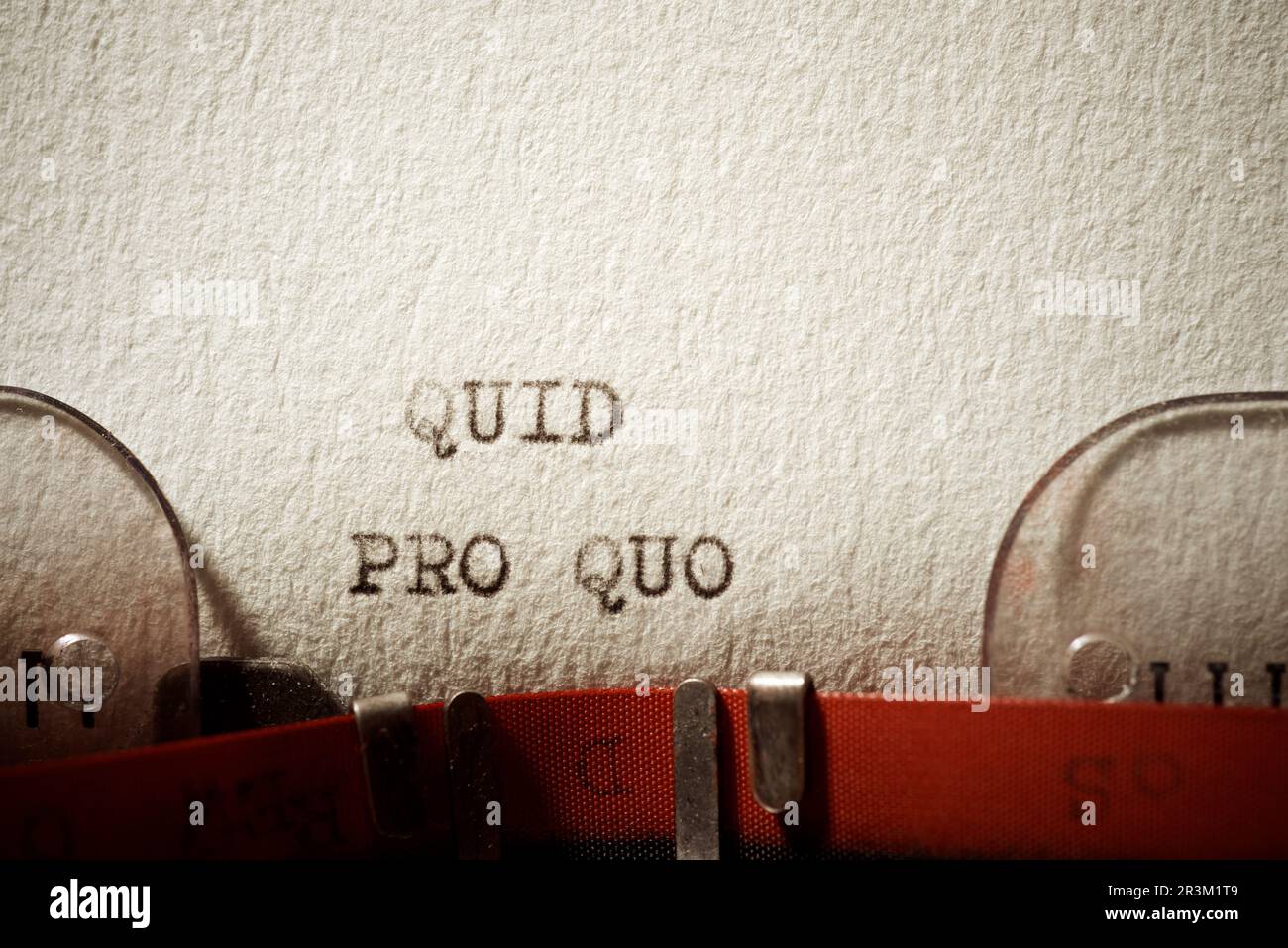 Quid pro quo text written with a typewriter Stock Photo - Alamy