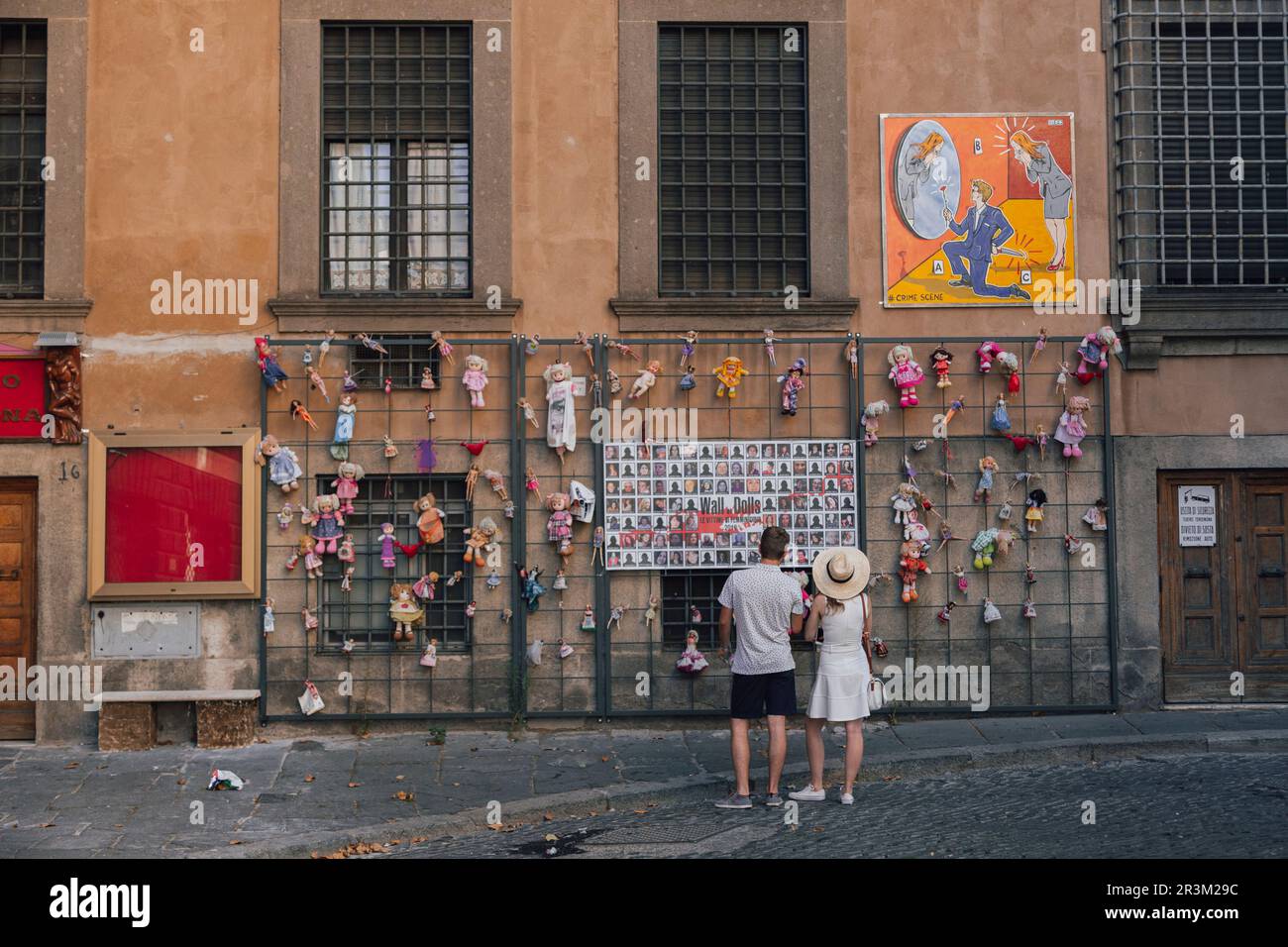 22 August 2019, Rome, Italy - people contemplate street art depicting ...