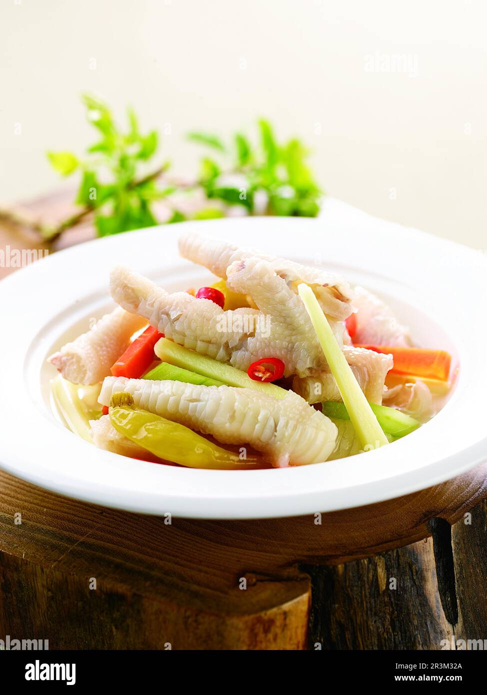 Chicken feet with hot Pepper on retro dark background.Delicious and unique Chinese food Stock ...