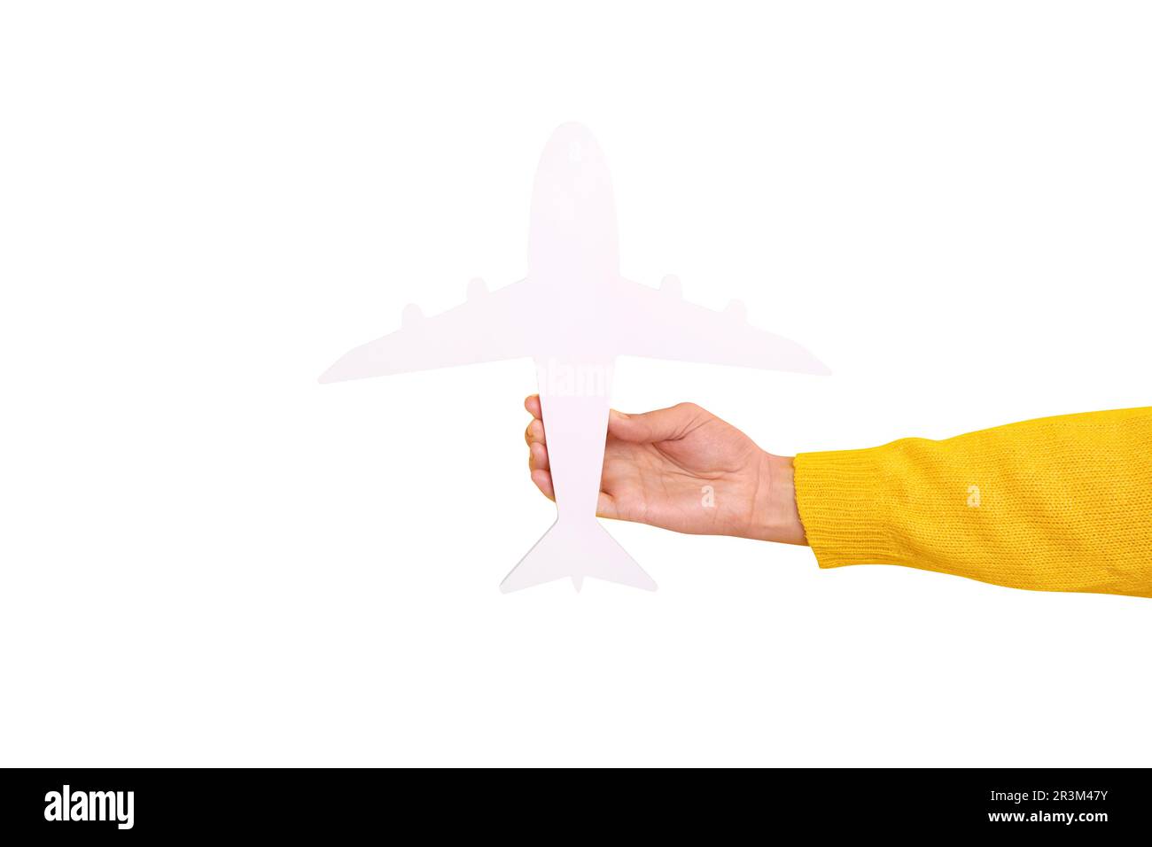hand holding airplane isolated on white background Stock Photo - Alamy