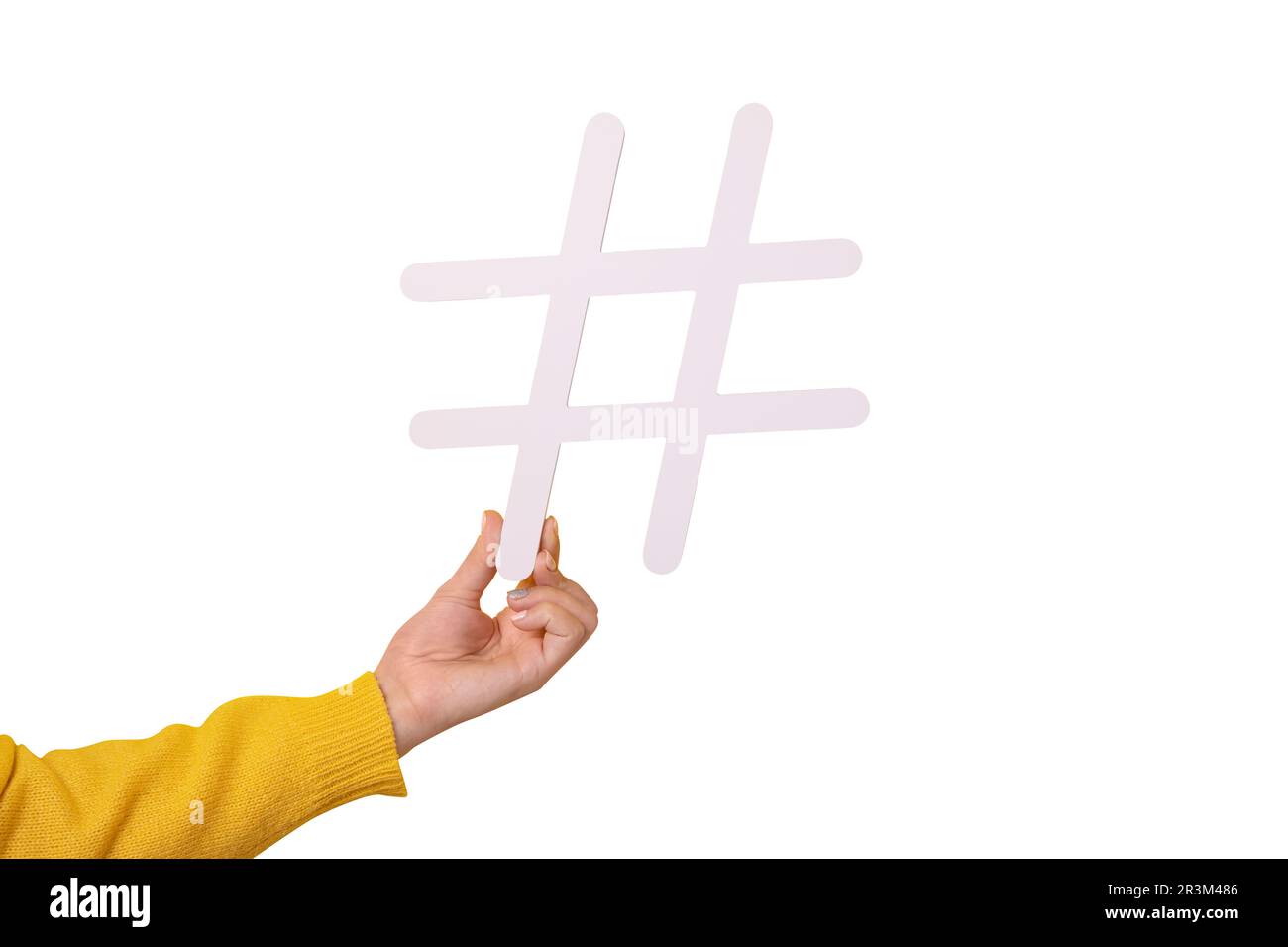hand holding big white hash sign, hashtag symbol of internet trends and ...