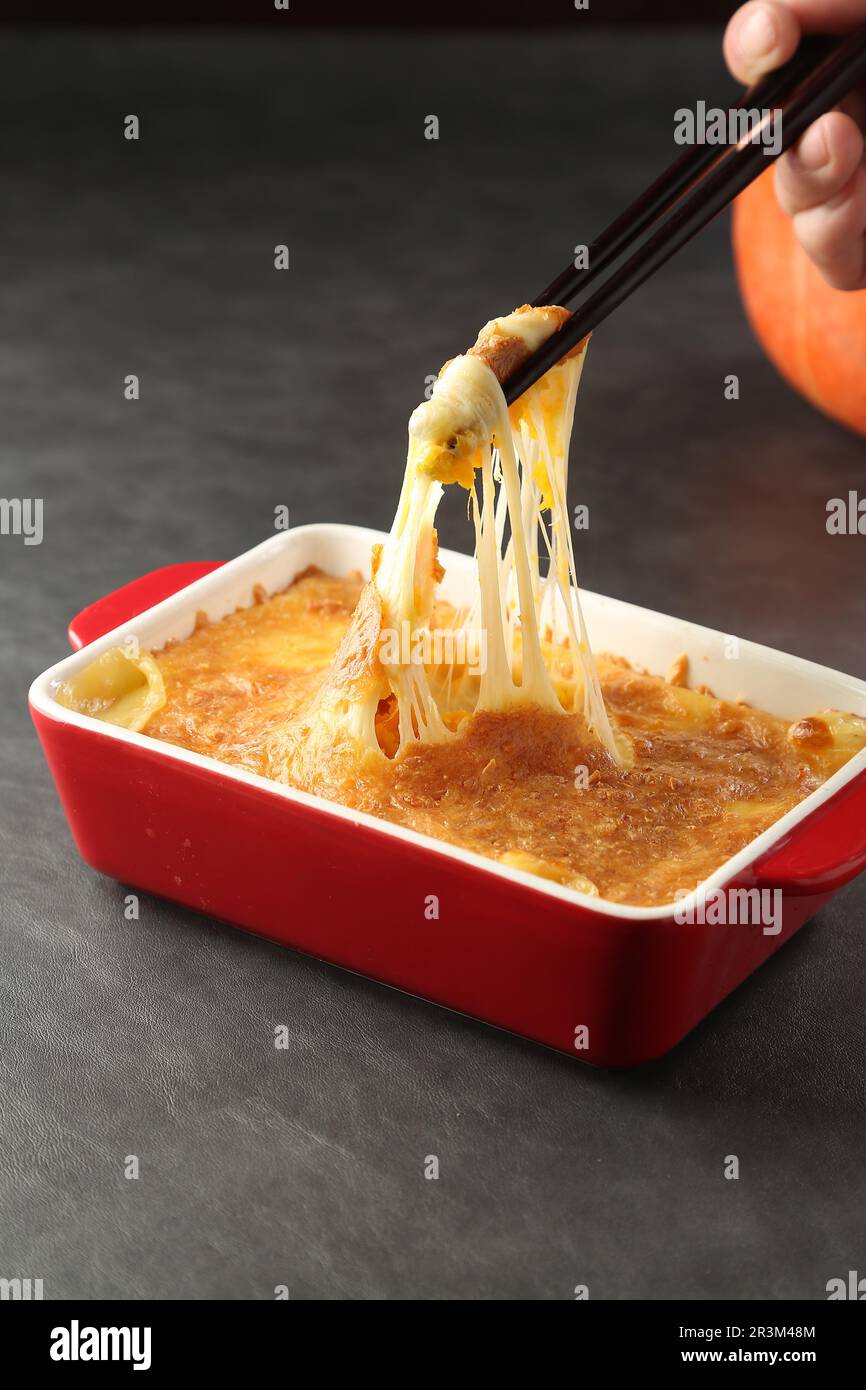 kimchi fried rice with pork and topped cheese in stone pot- Asian and ...