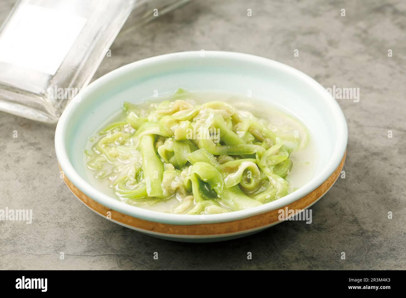 A plate of light and fresh Chinese home cooking, stir-fried loofah ...