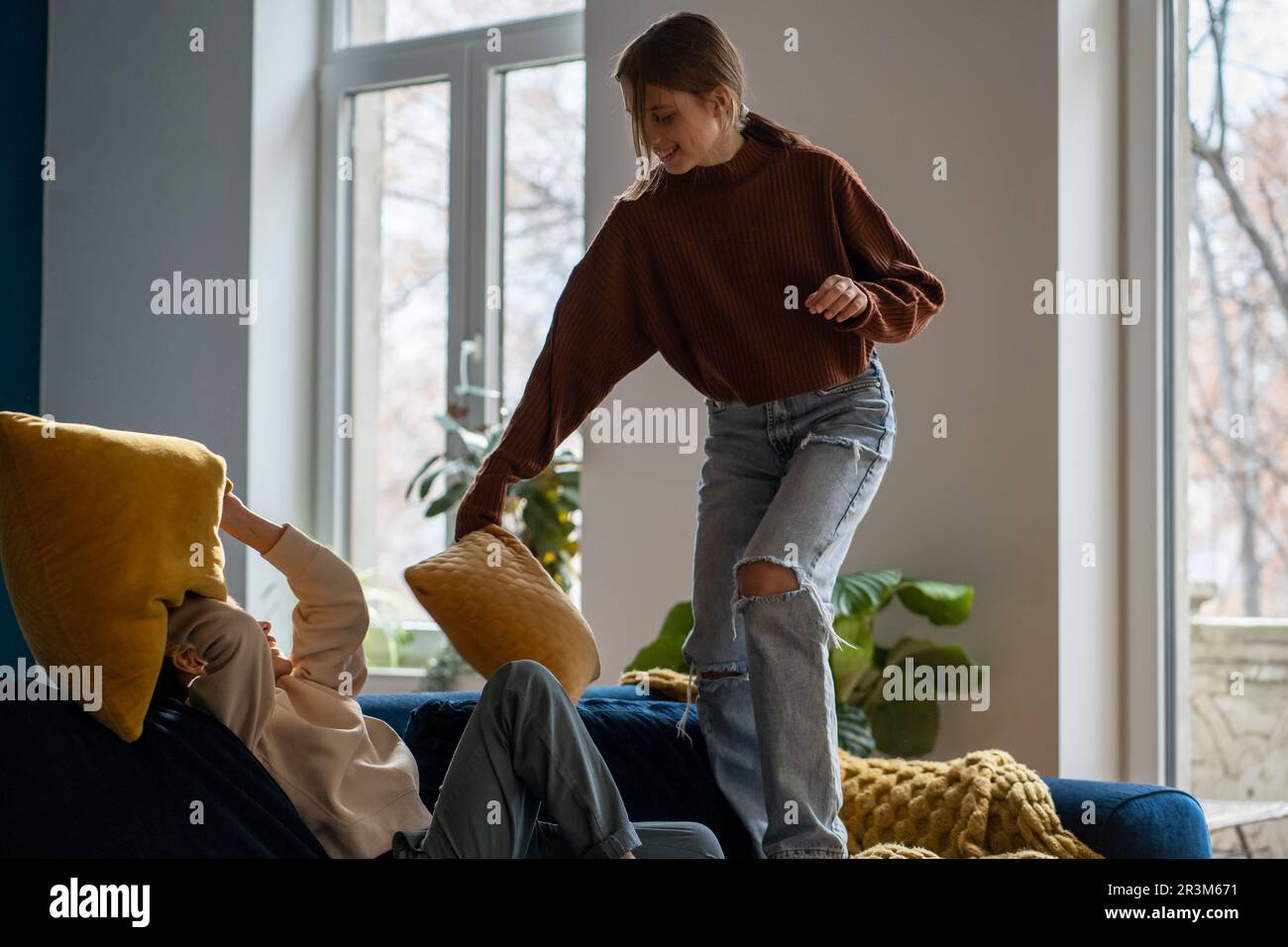 Brother sister play fighting hi-res stock photography and images - Alamy