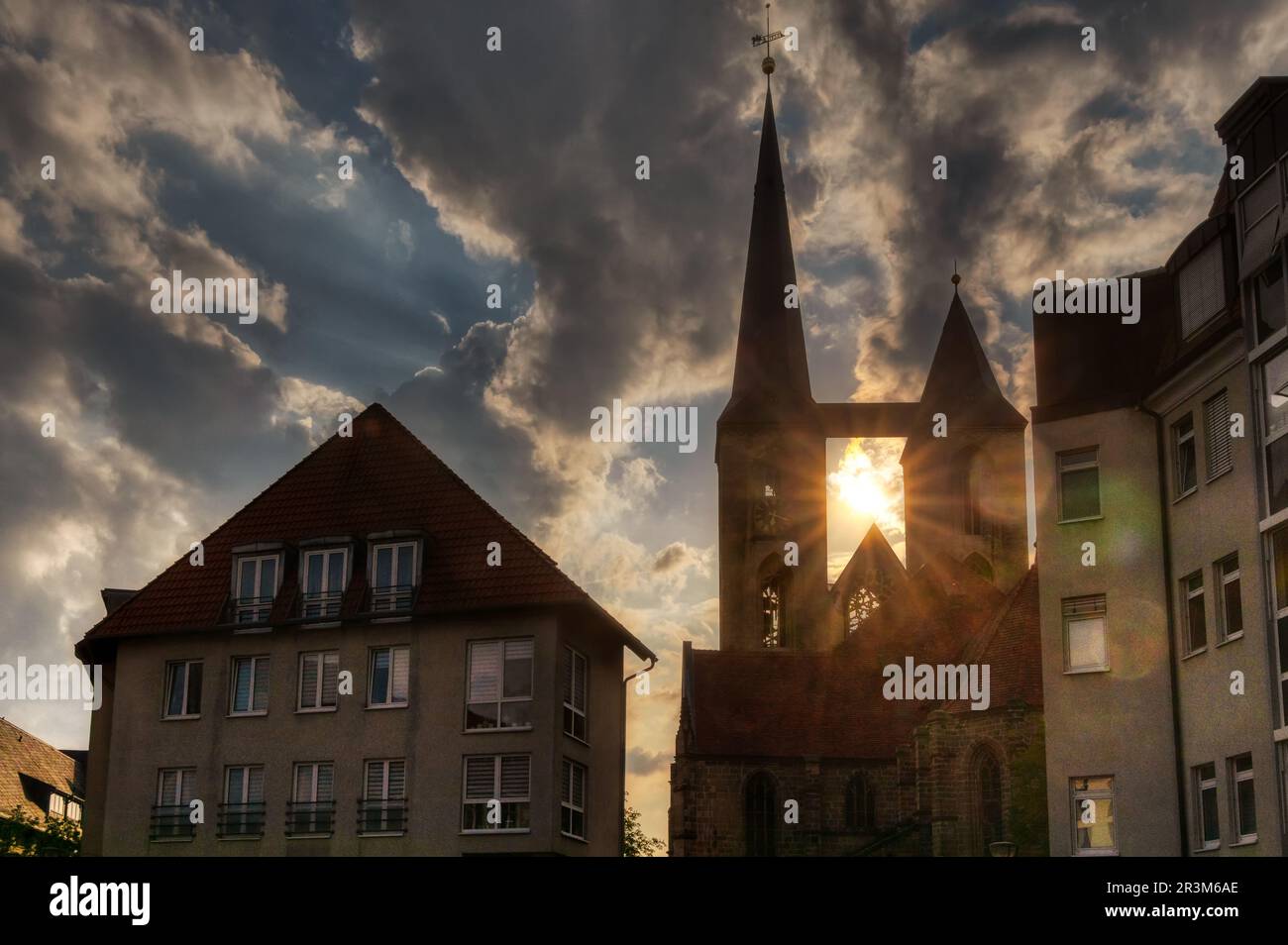 Cathedral church Halberstadt resin light mood clouds Stock Photo - Alamy