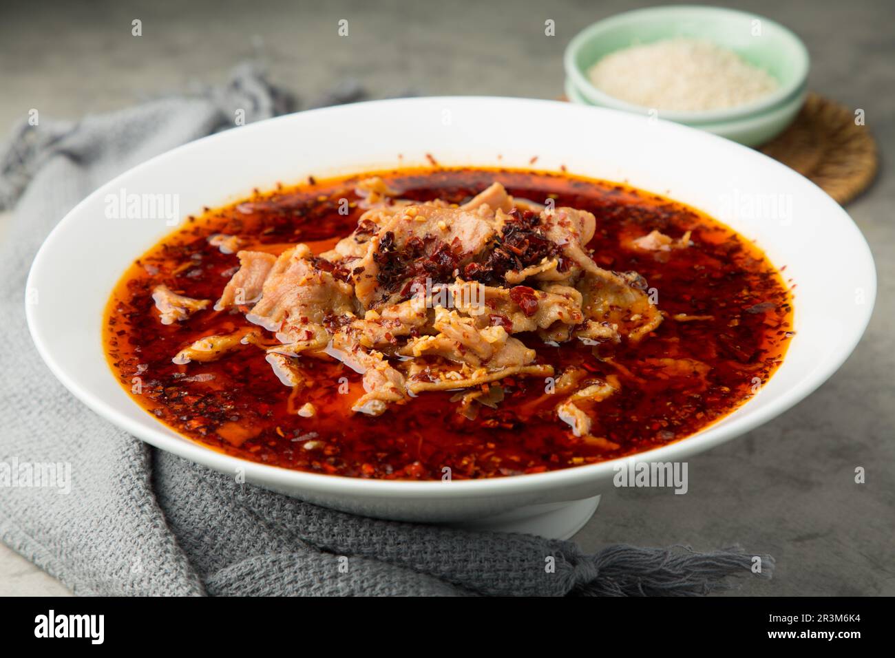 Poached Sliced pork in Hot Chili Oil Stock Photo - Alamy