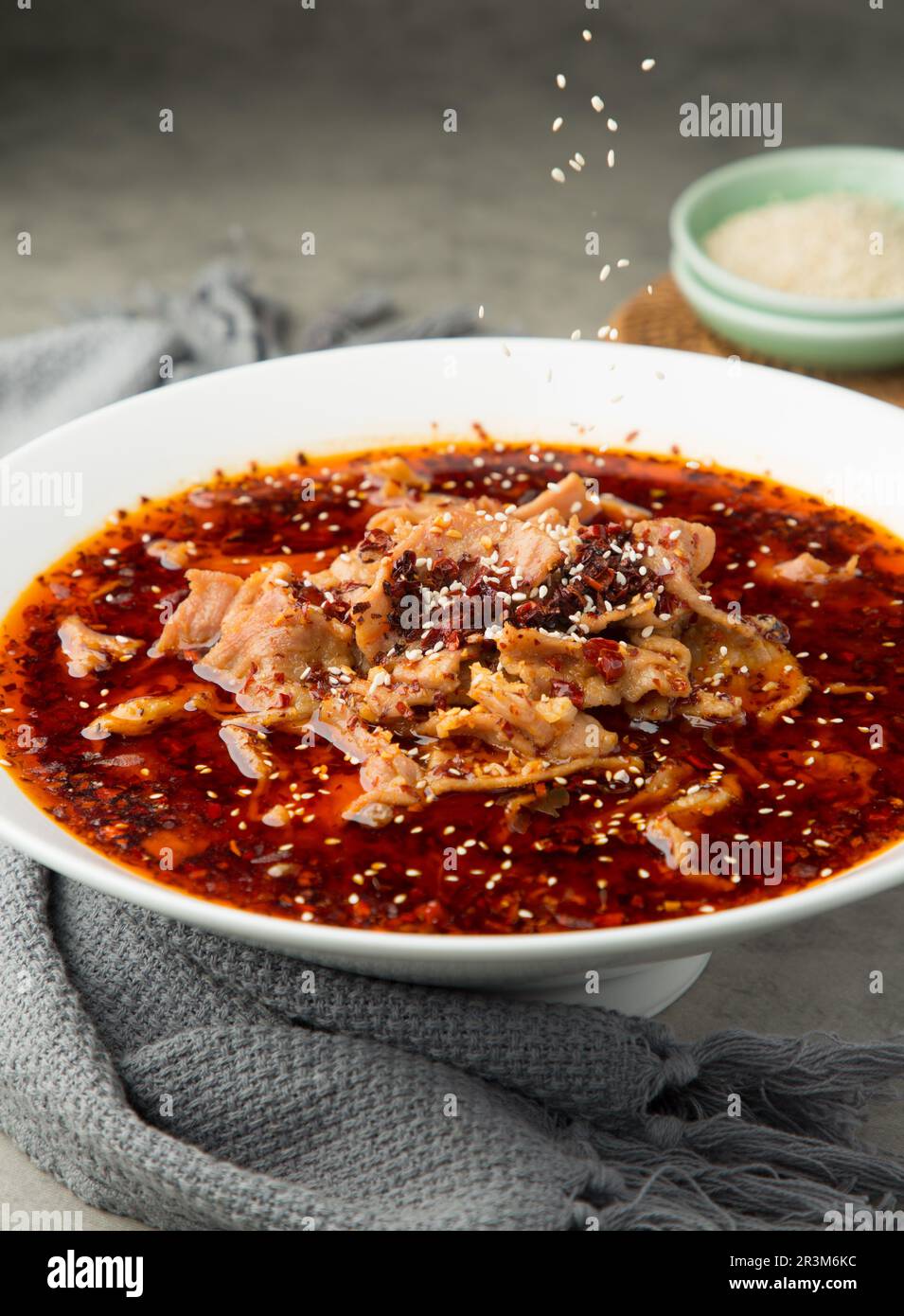 Poached Sliced pork in Hot Chili Oil Stock Photo - Alamy