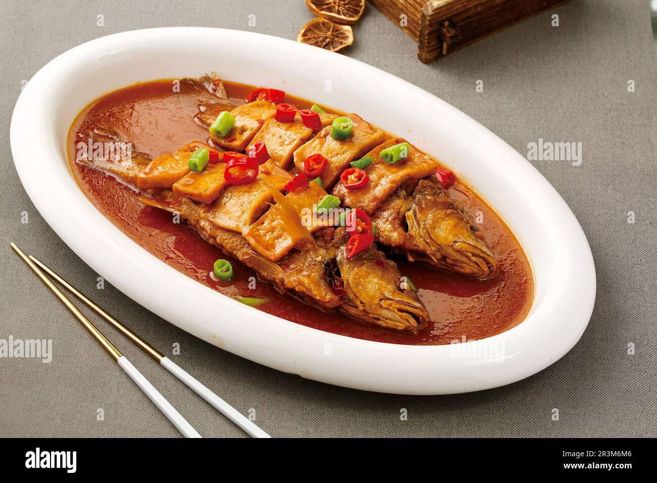Braised Yellow Crocker Fish with tofu Stock Photo - Alamy