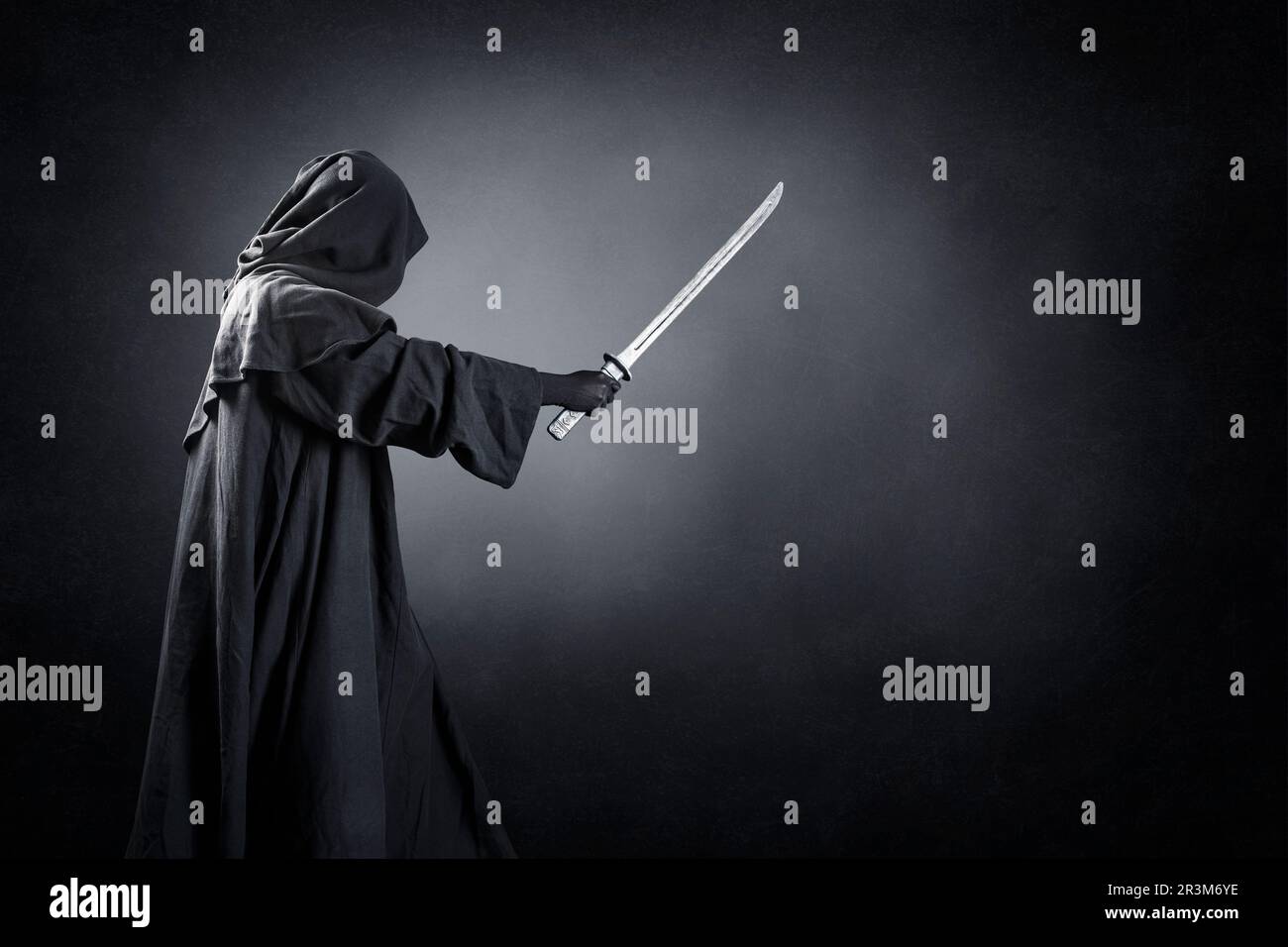 Samurai warrior with katana sword over dark misty background Stock ...